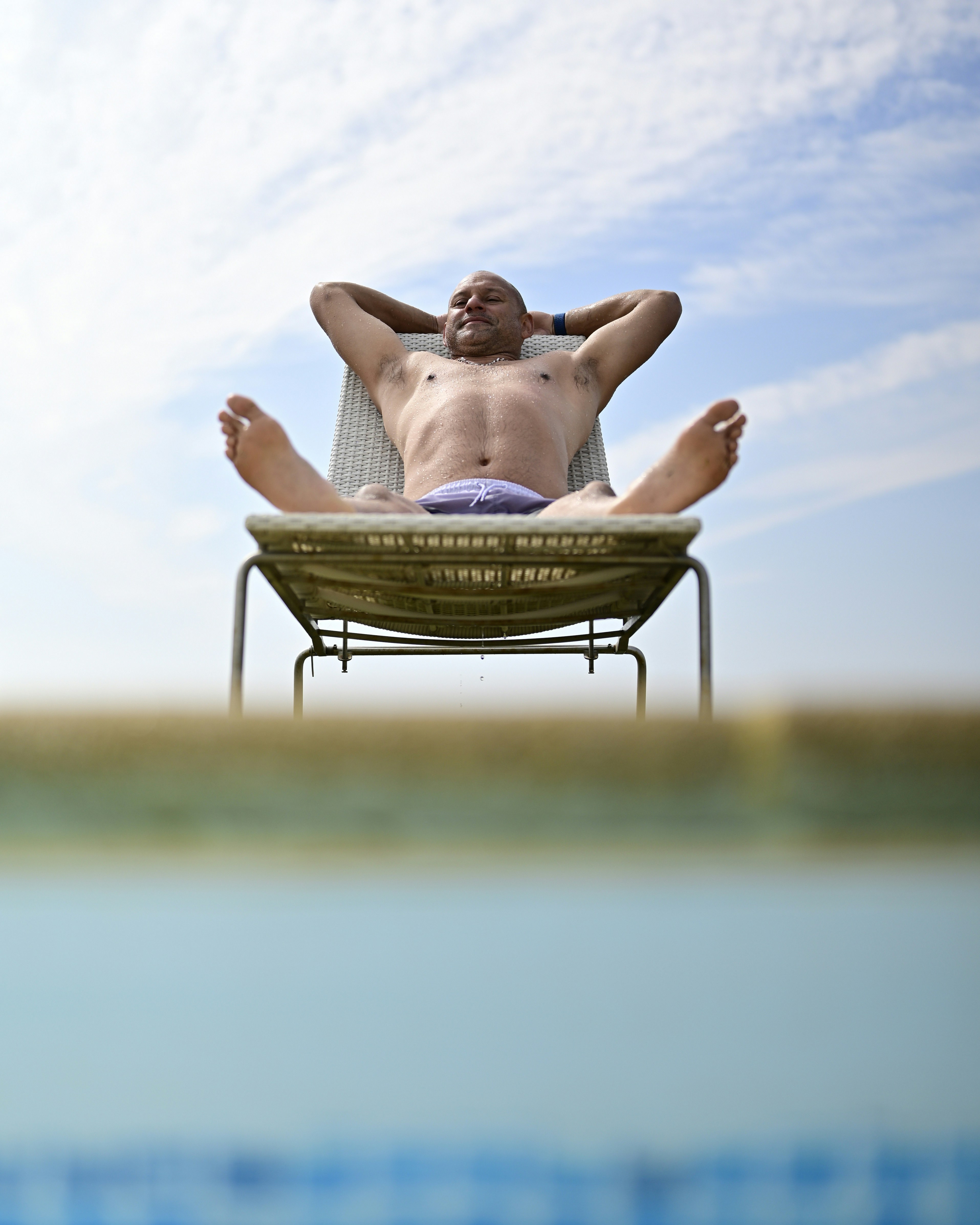 Sun-Kissed Respite: A Relaxed Recliner Under Open Skies