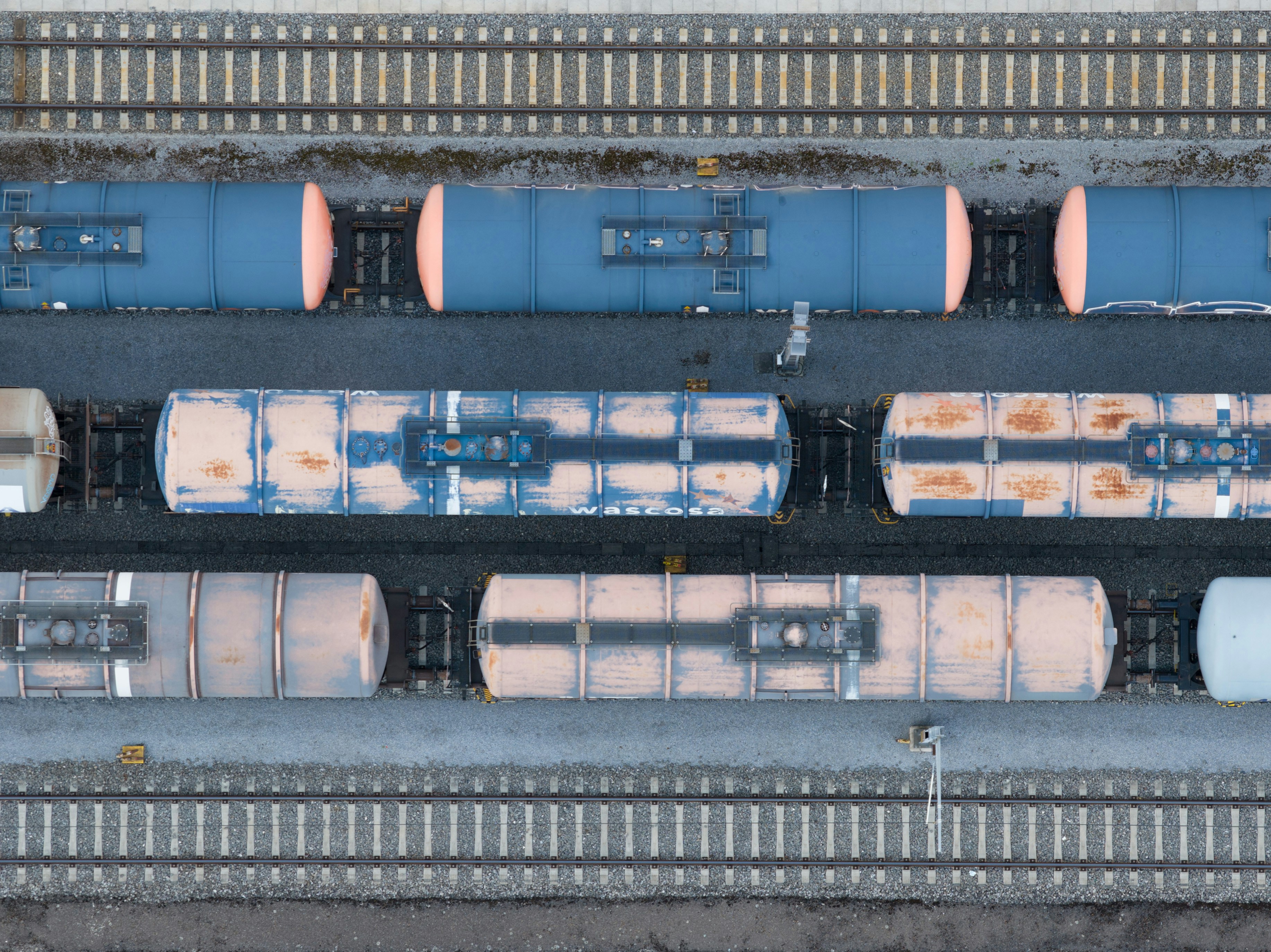 Railway Rows: Aerial inspection of rusted tanker cars from above