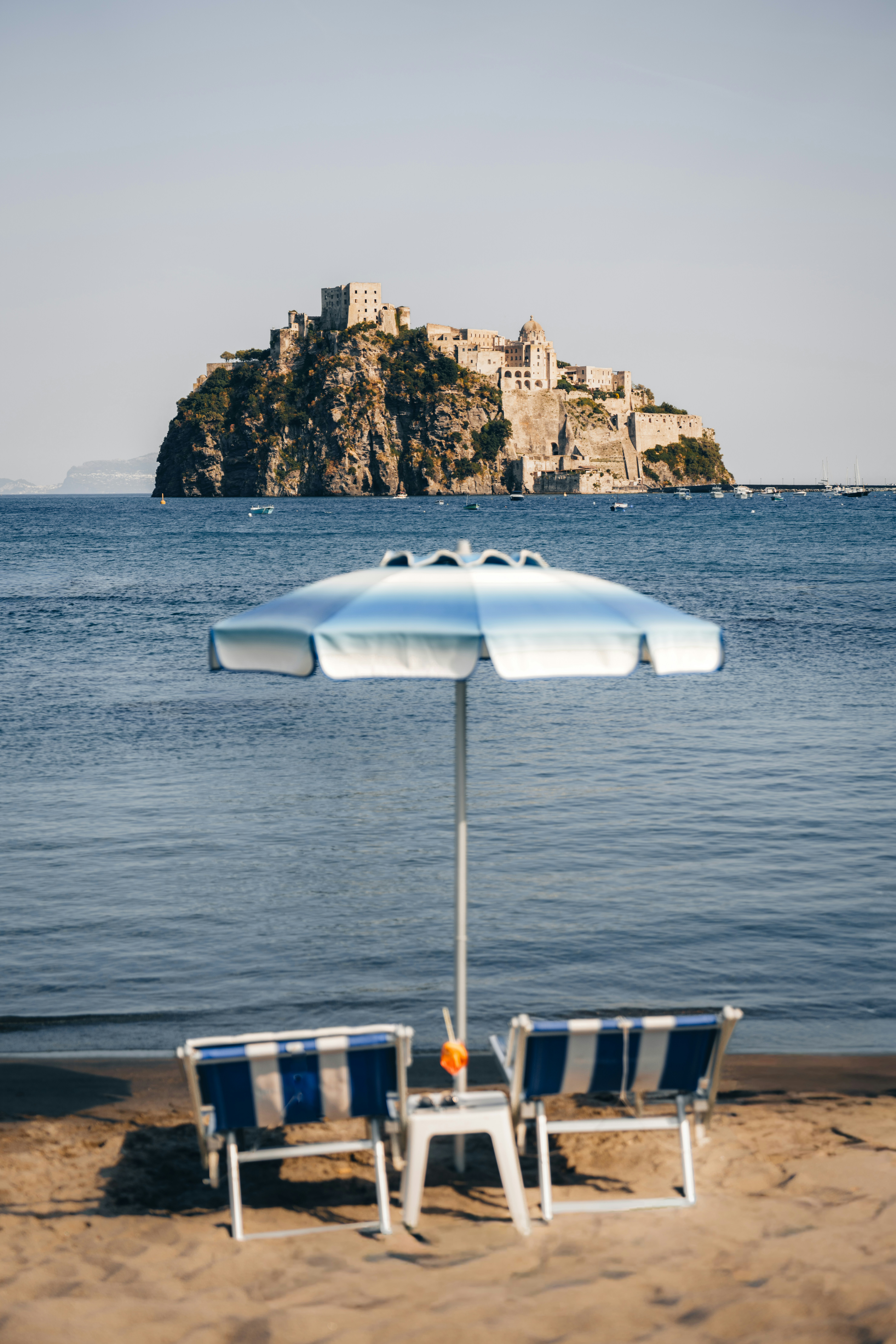 Island Fortress Rising Above the Beachfront Calm