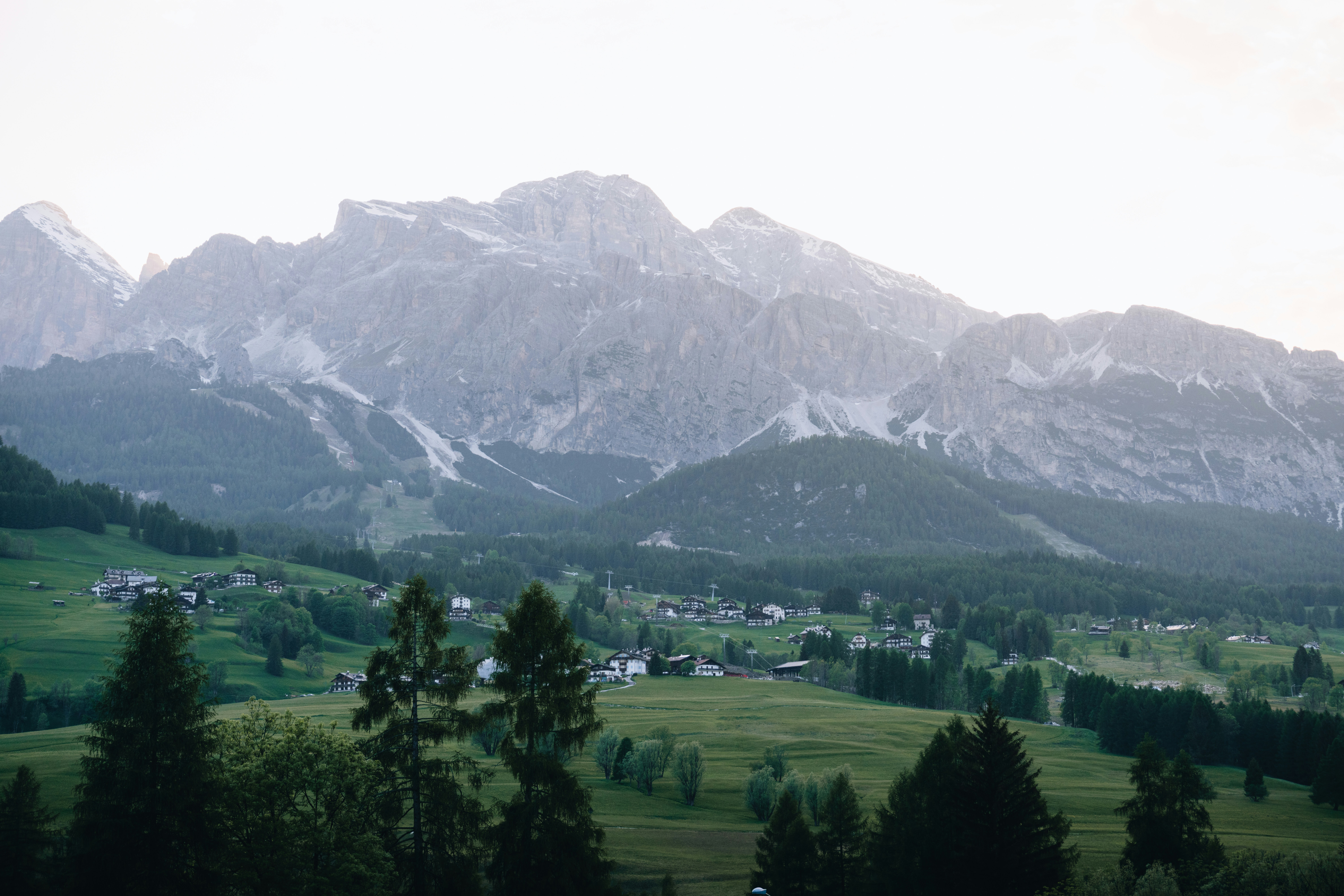 Quiet Alpine Valley Under Looming Peaks