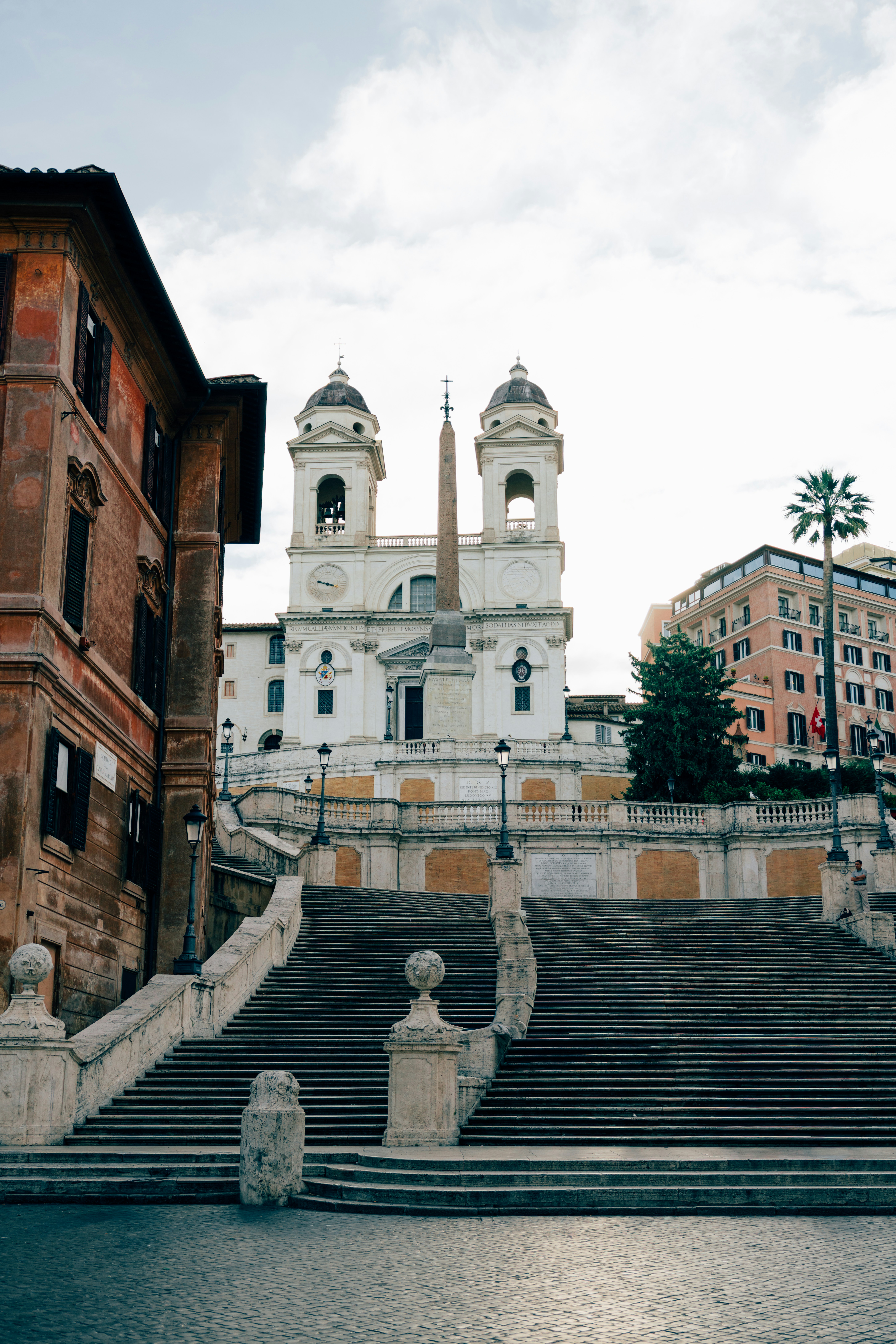 Iconic spanish steps and trinità dei monti church in rome.