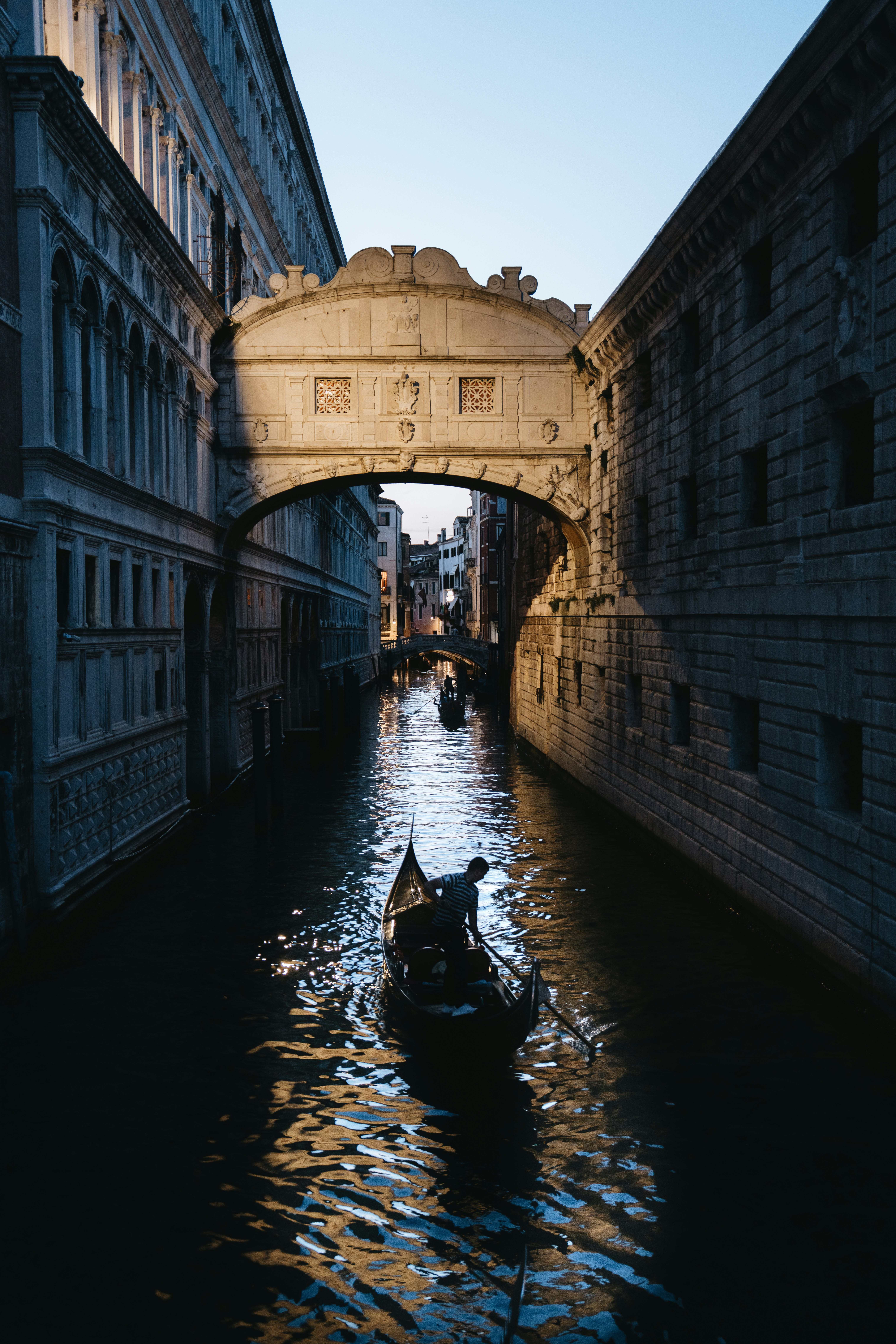 Gondola Passage Under the Arched Bridge