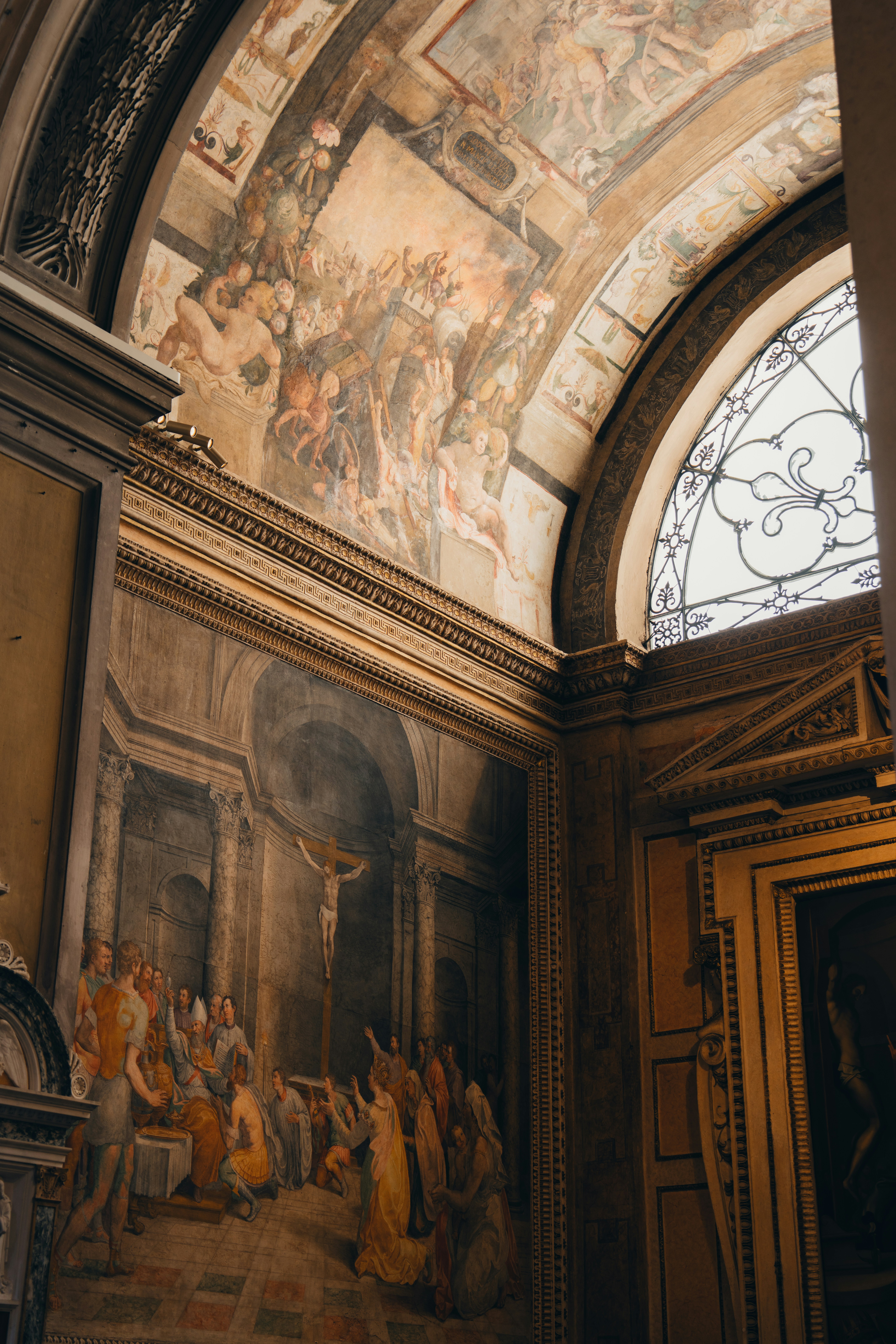 Cruciform Frescoed Hall: Sacred Scene Framed by Ornate Archways