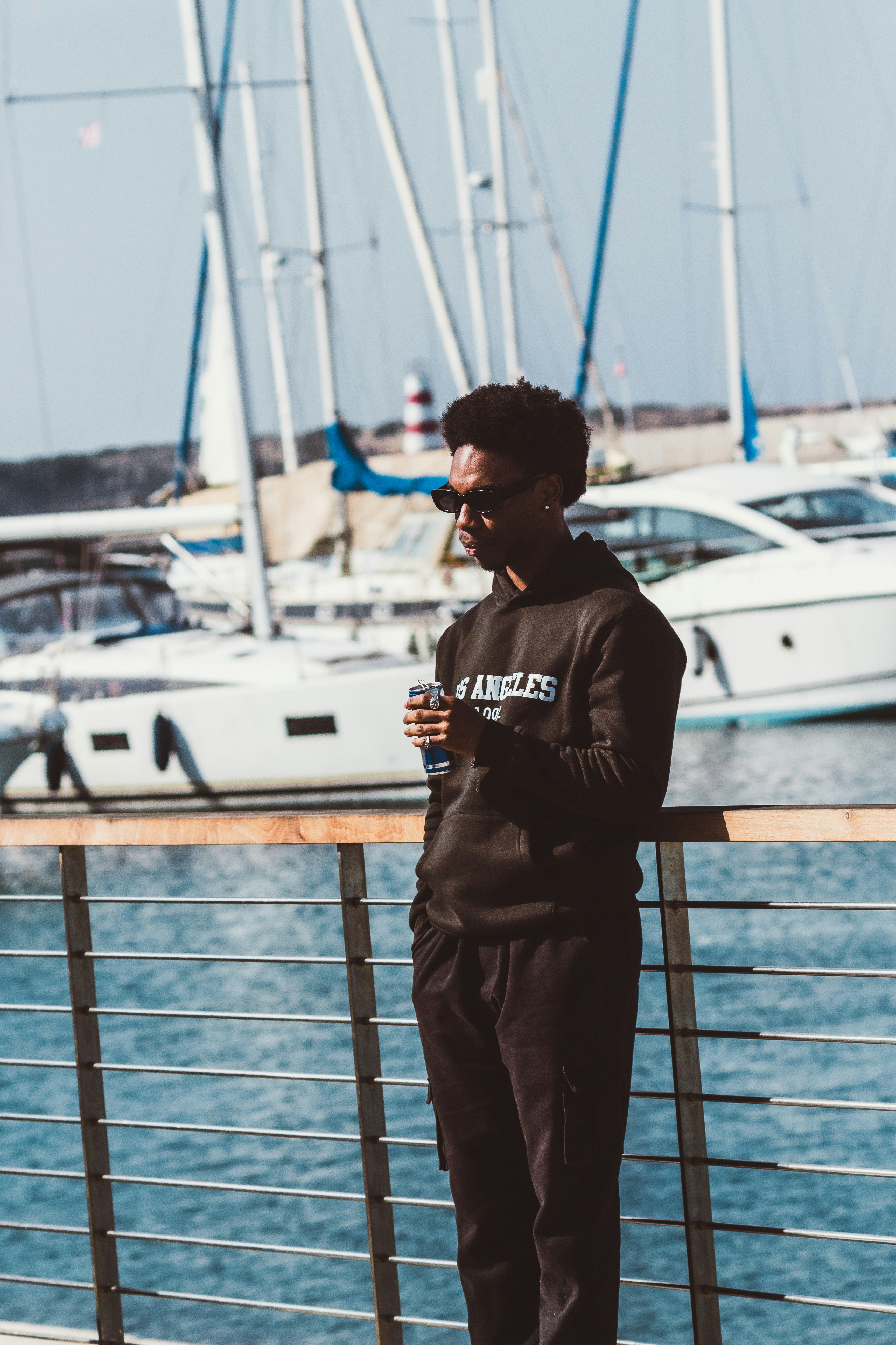 Harbor Quietude: A Portrait on the Marina Rail