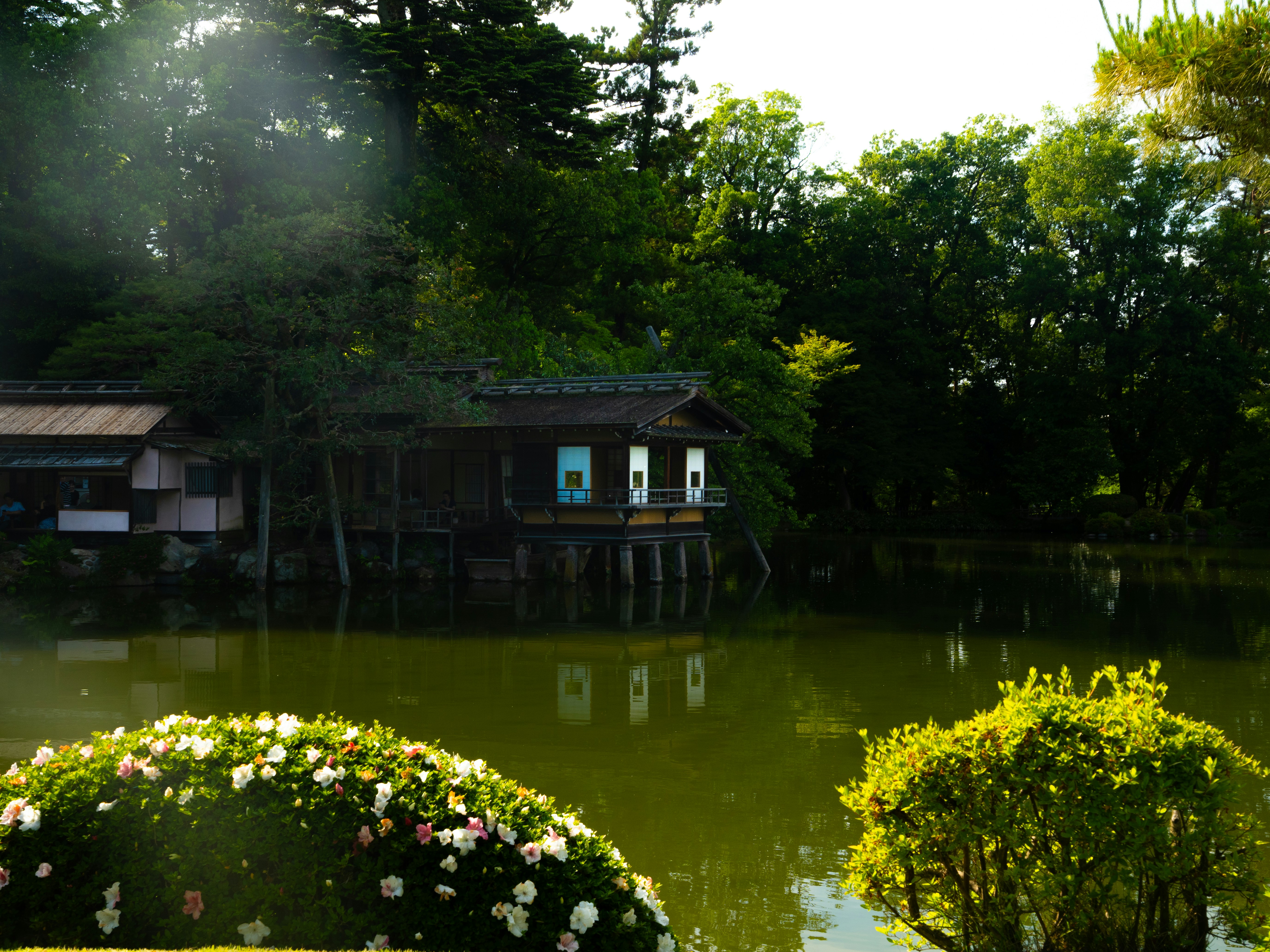 Waterside Teahouse Reflected in Quiet Pond