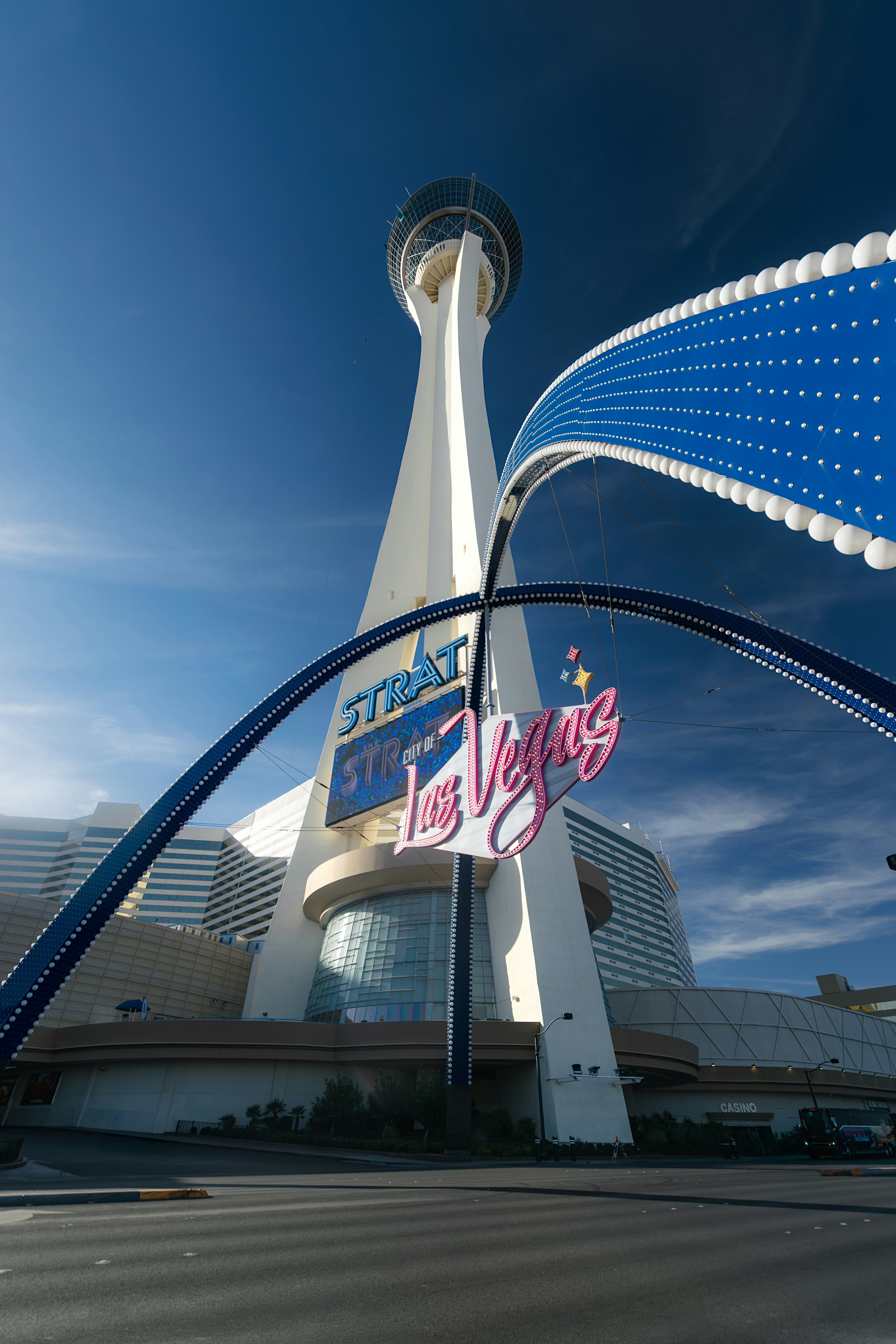 Vegas Neon Arc: The Stratosphere Tower Greeted by Blue Lights