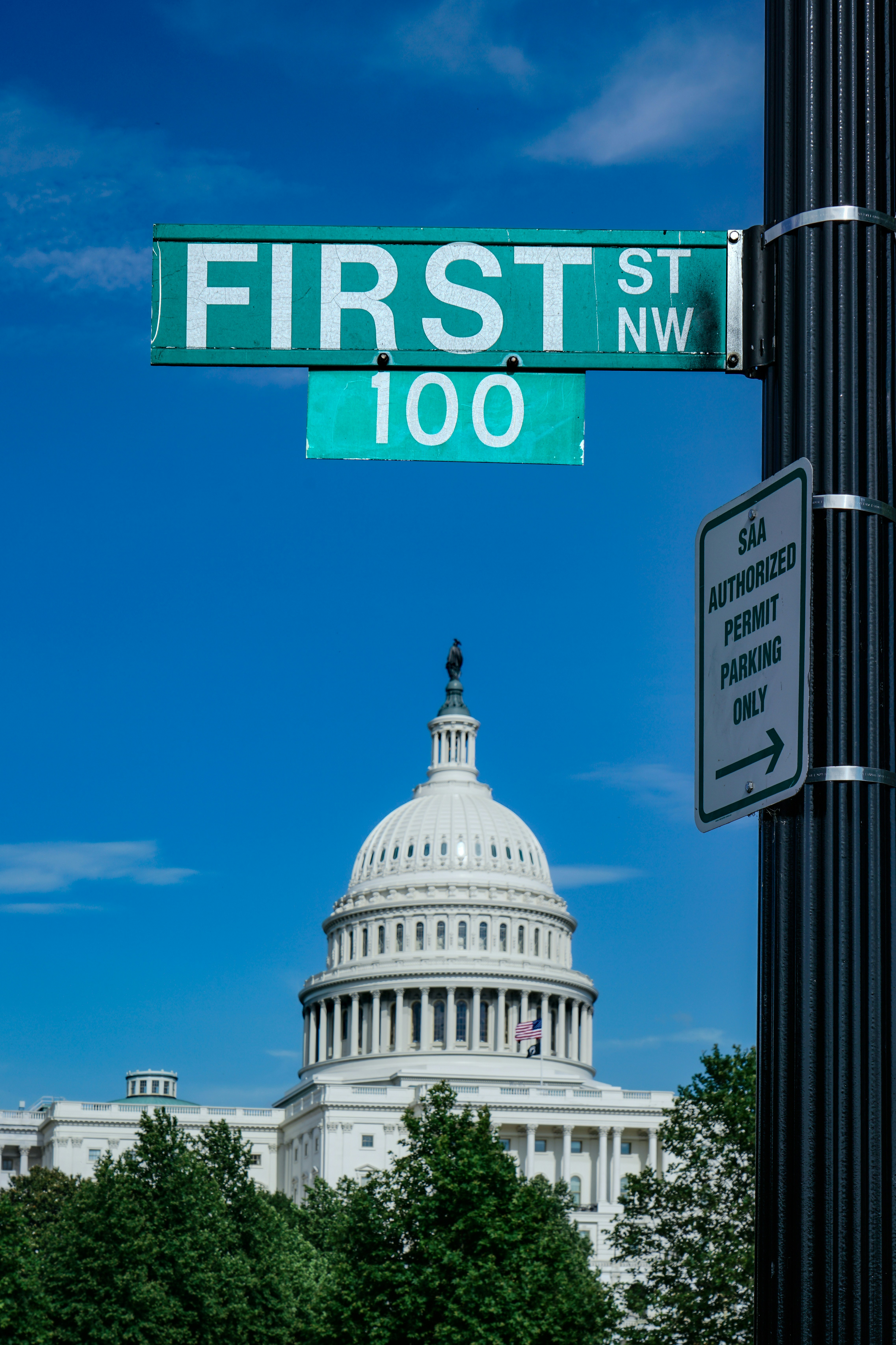 Capitol Blue: Street Sign Framing the Dome