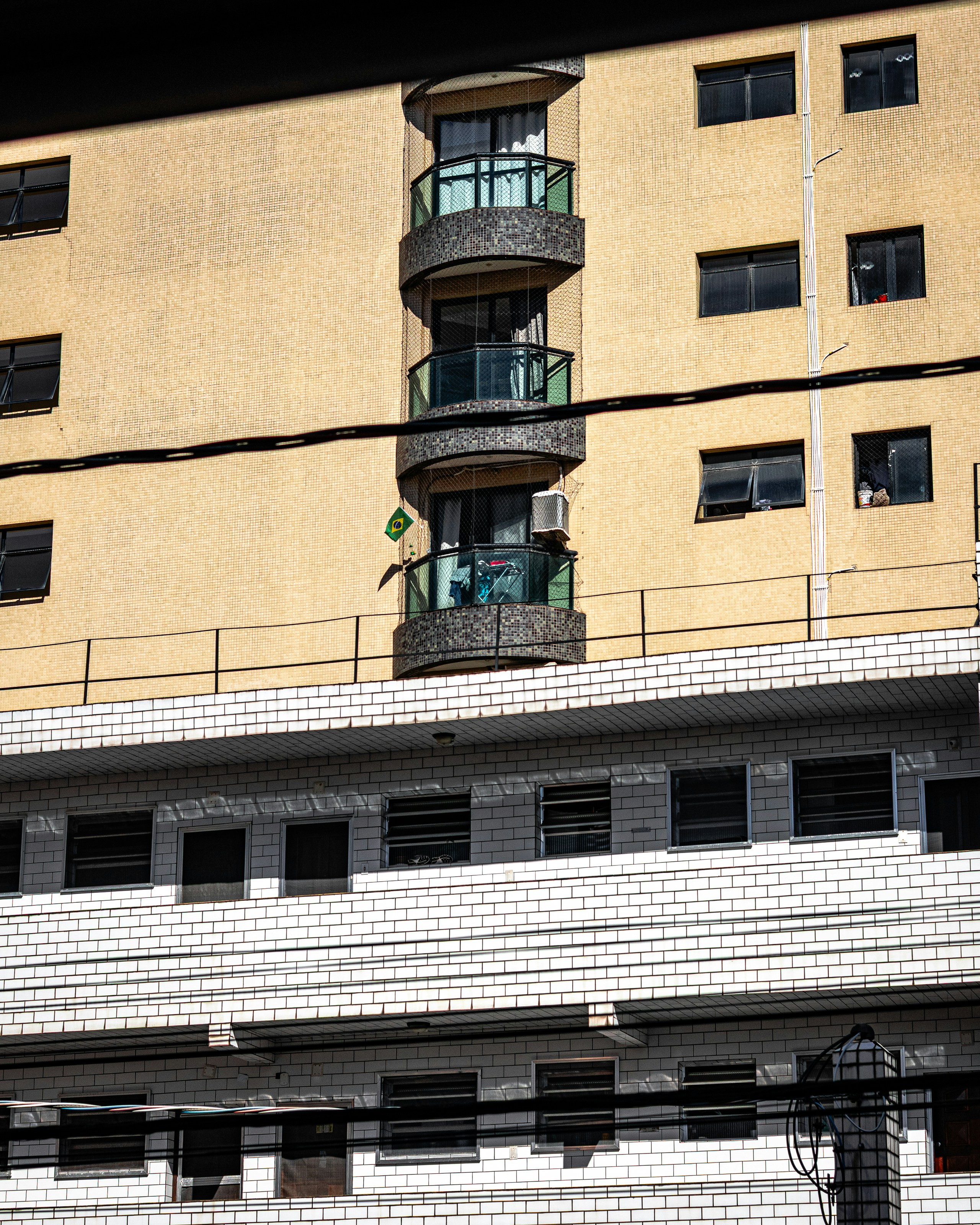 Balconies Cutting Across a Facade: A Vertical Slice of Urban Geometry