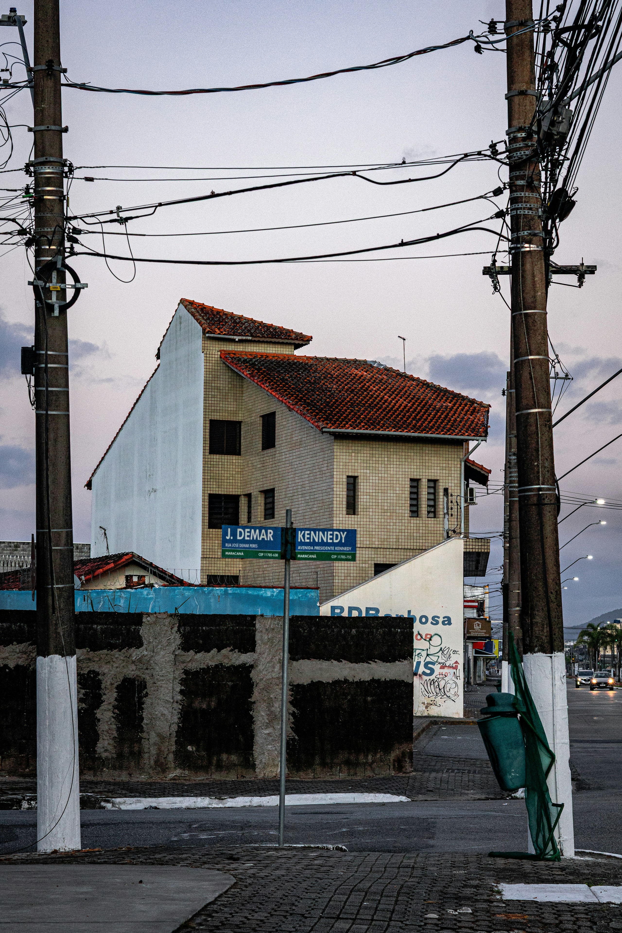 Urban Corner: Telegraph Poles Framing a Quiet Street Scene