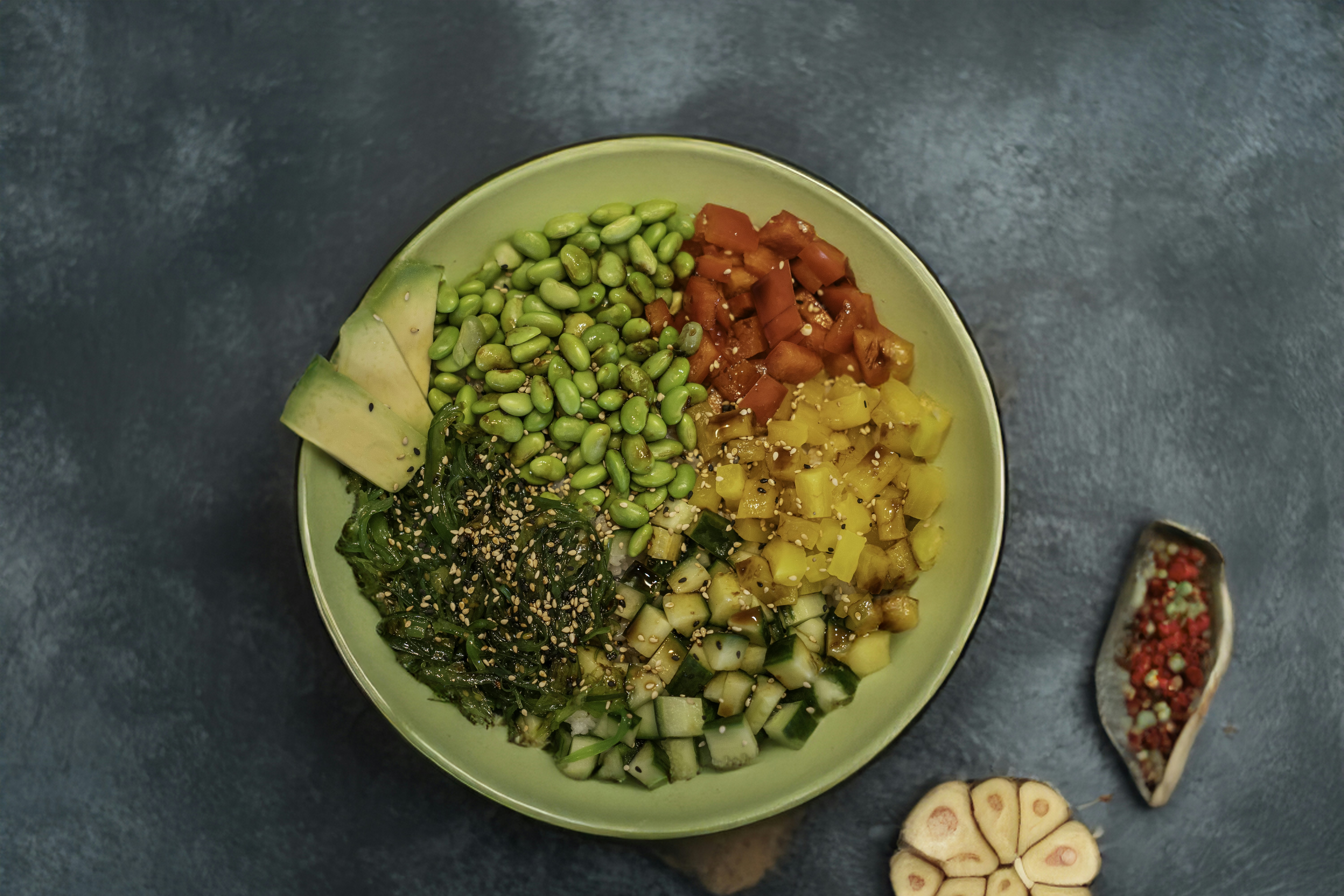 Rainbow Bowl of Fresh Diced Fruits and Seaweed Garnish