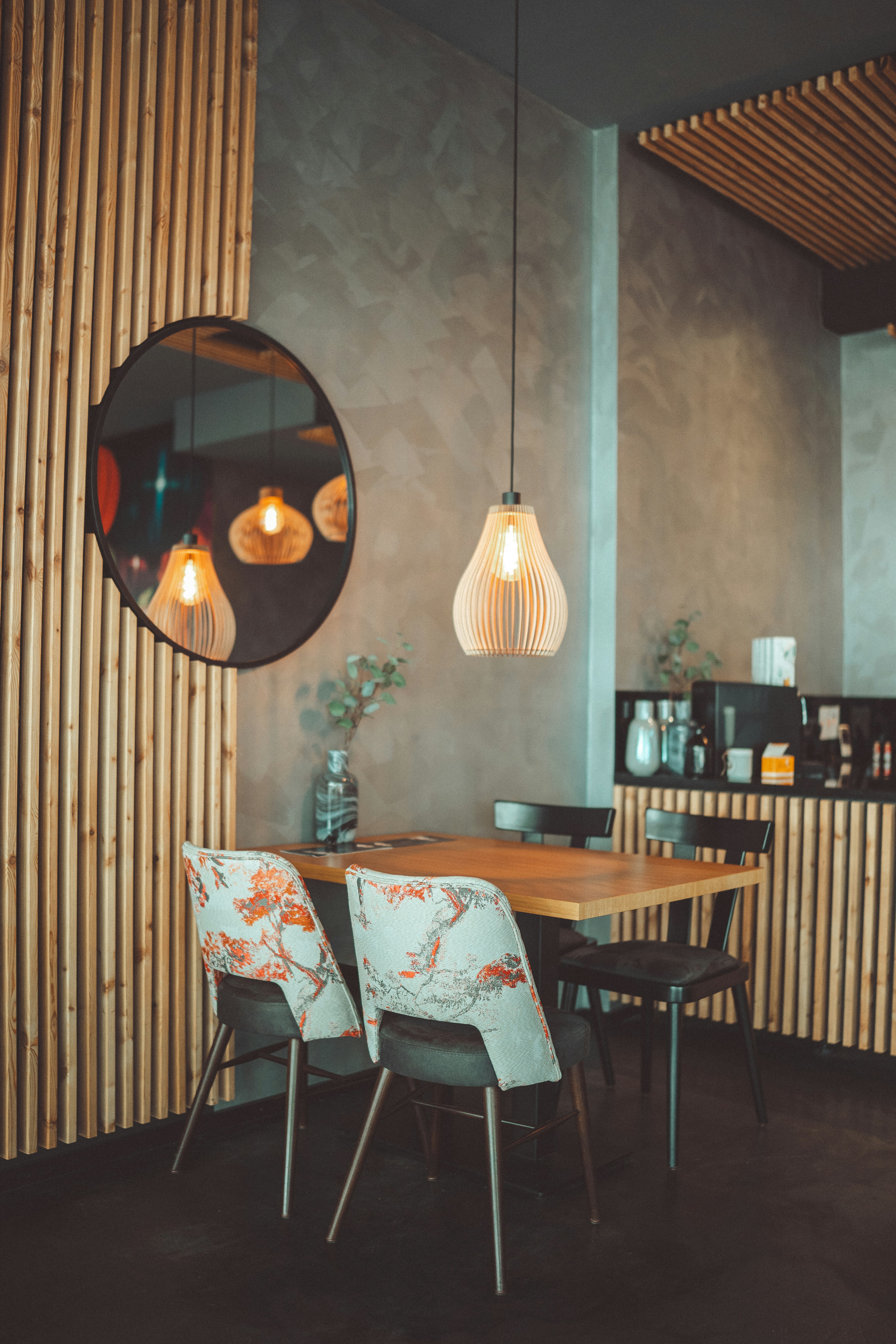 Amber Lanterns Over a Cozy Dining Nook