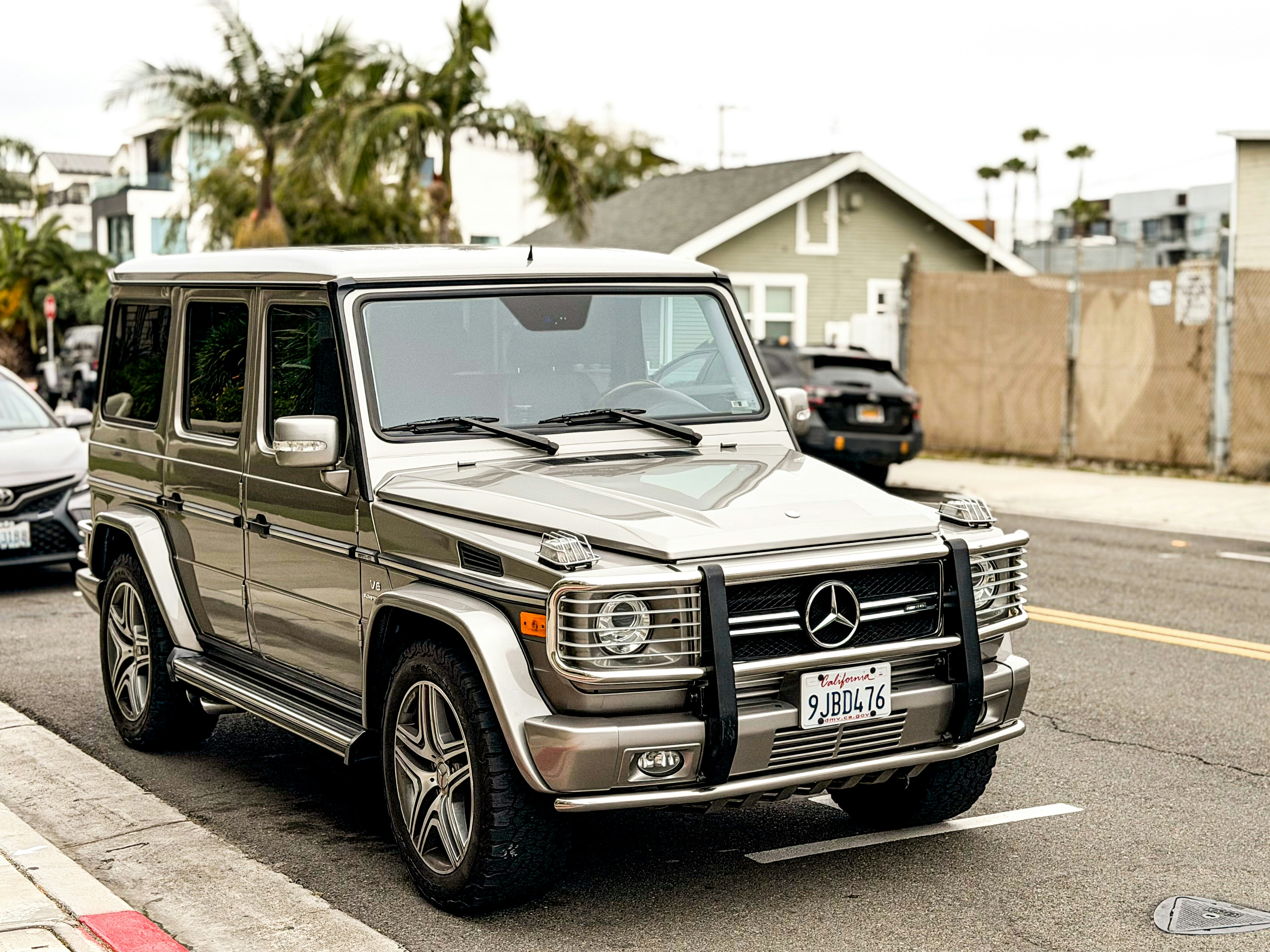 Chrome Fortress: A Mercedes G-Class Anchored Between Street and Sky