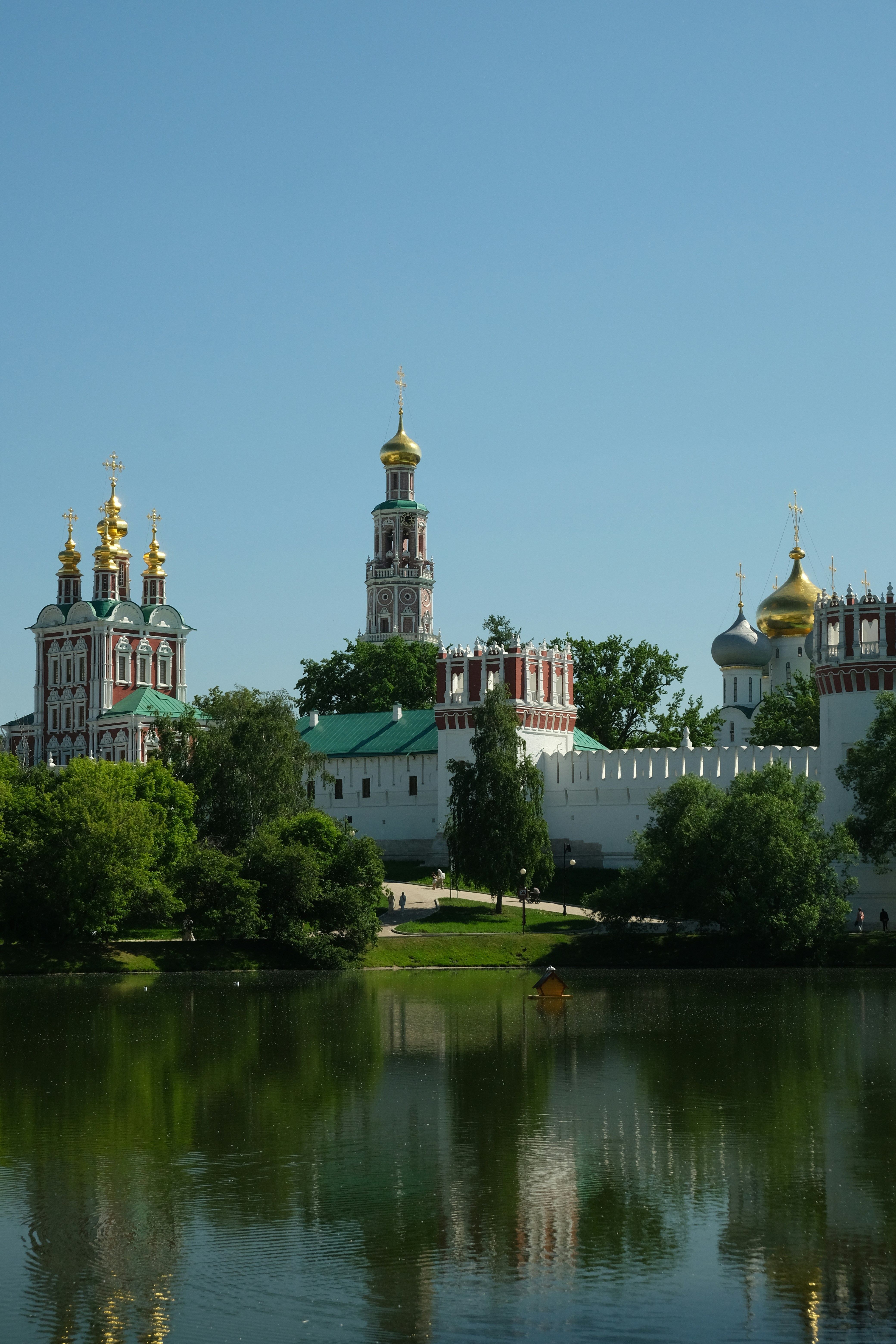 Golden Cathedral Silhouette Over a Tranquil Waterway