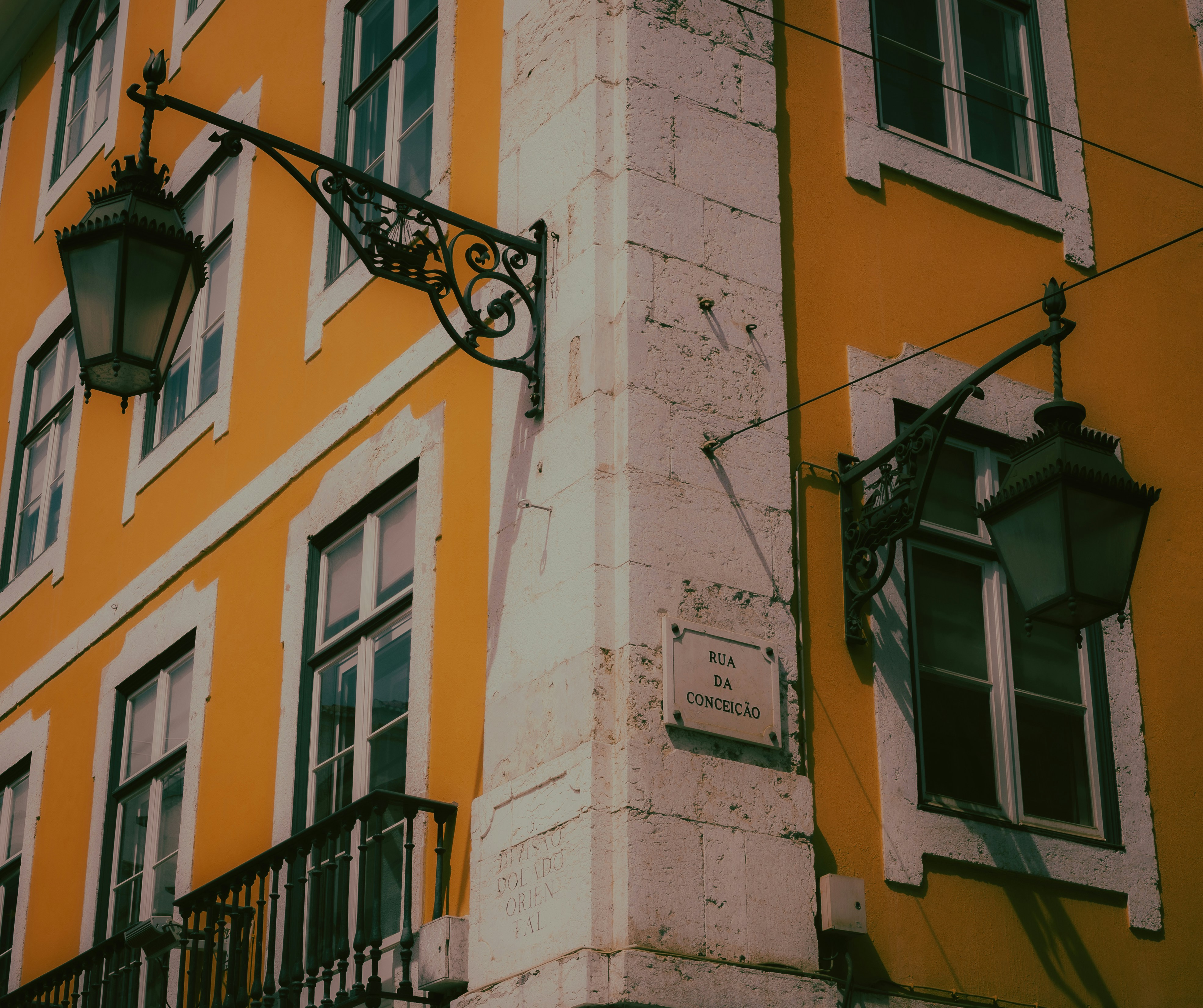 Corner of Sunlit Yellow: A Portuguese Facade in Focus
