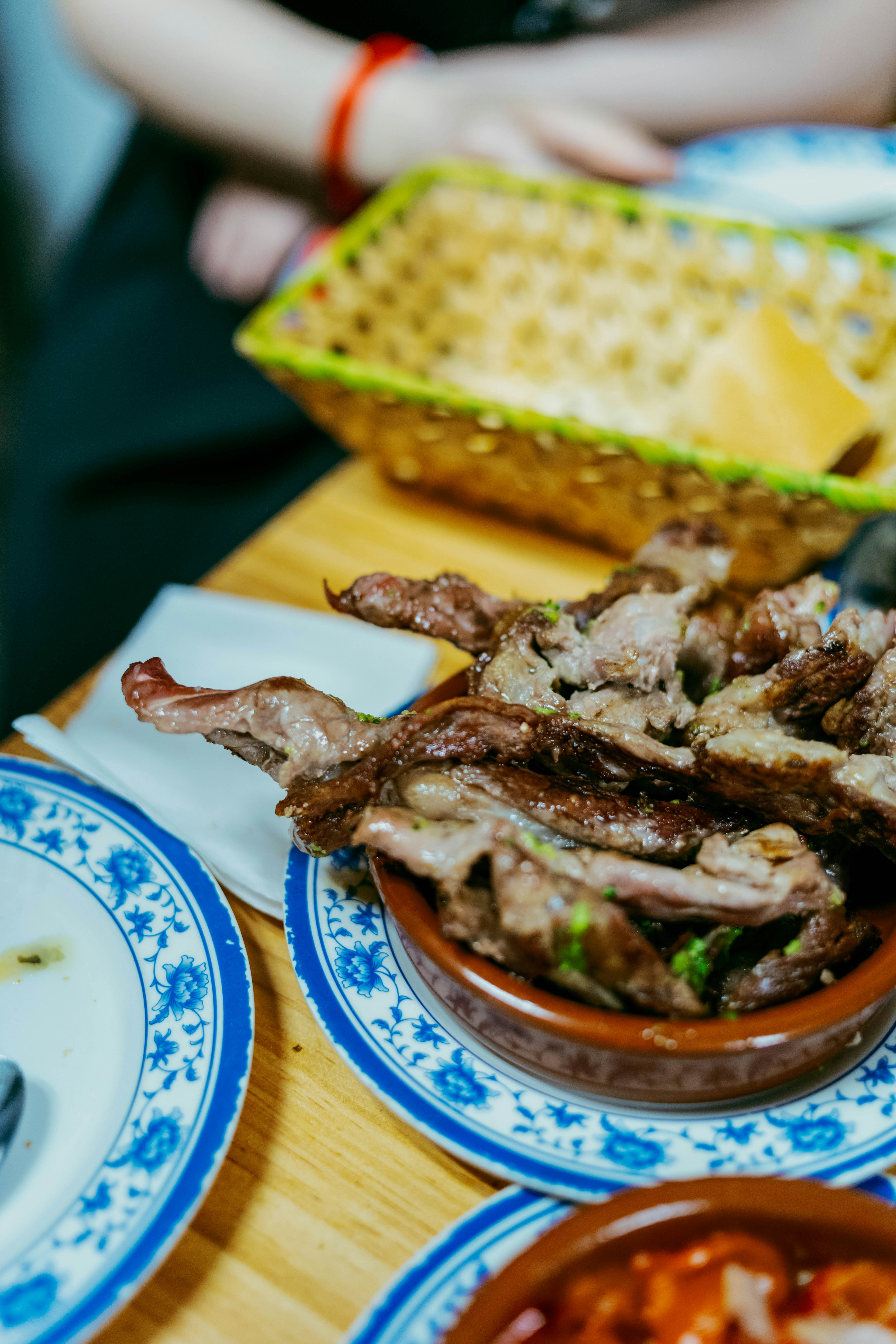Charred skewers and crispy basket: a feast on wooden platters