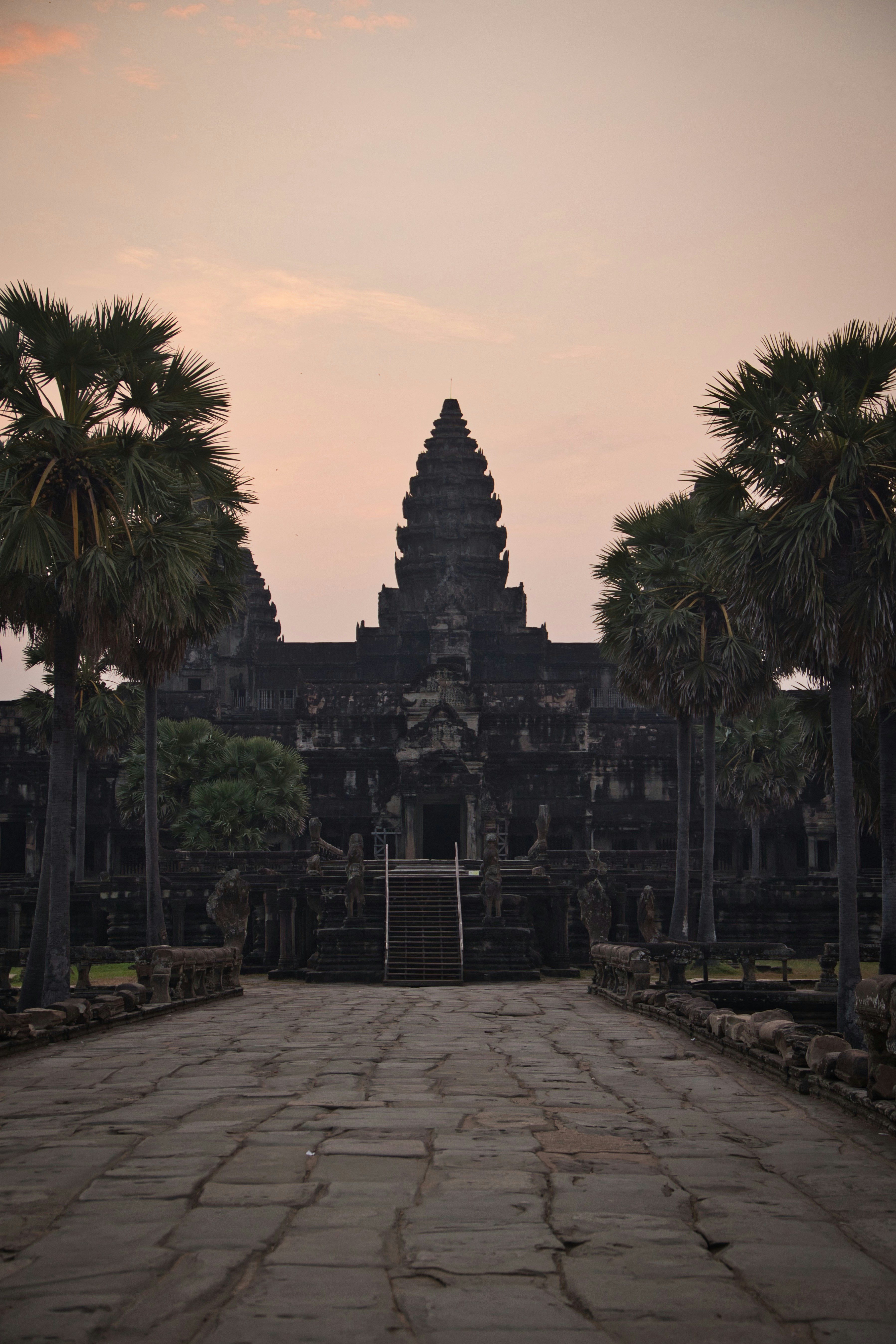 Bronzed Temple Gateway at Sunset: A Path to the Central Peak