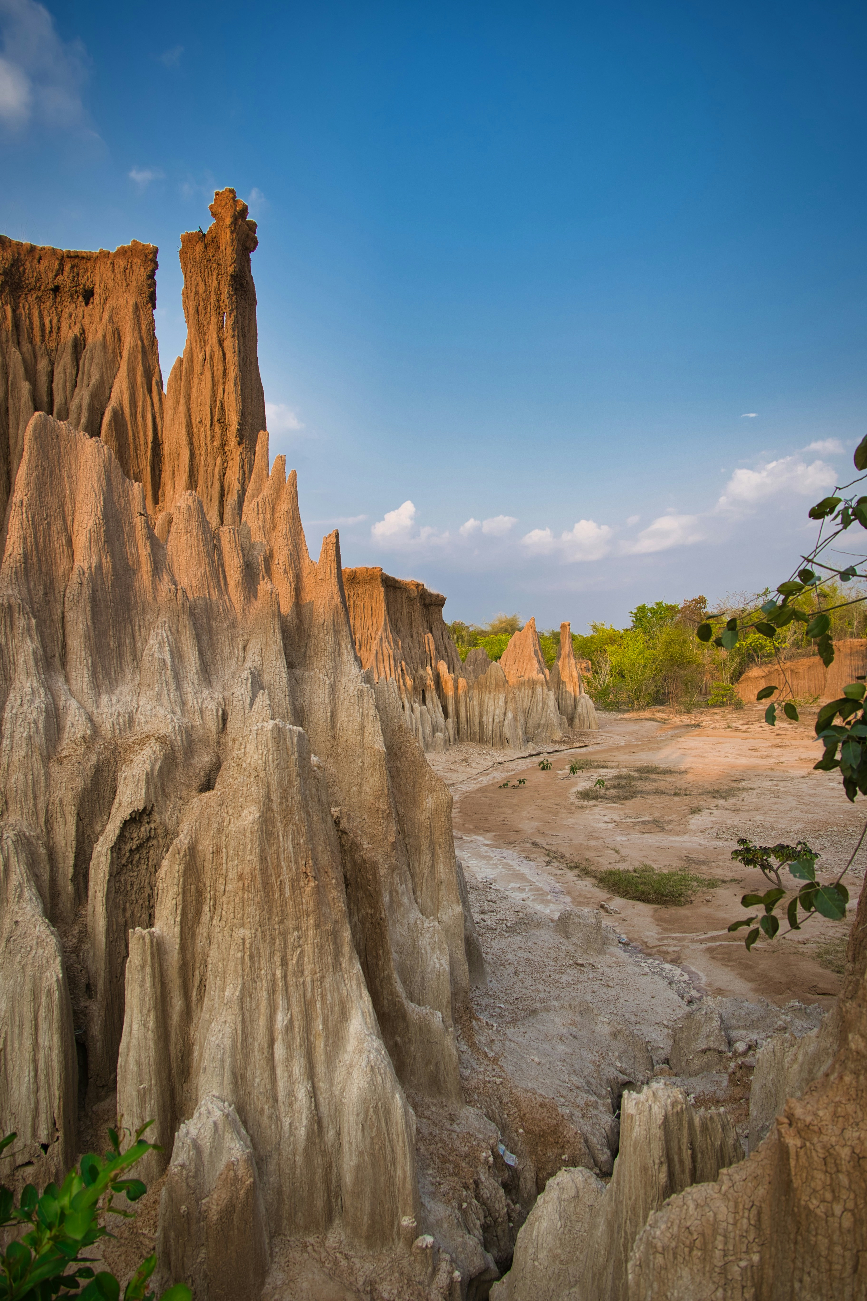 Earth-sculpted sentinels under a cobalt sky