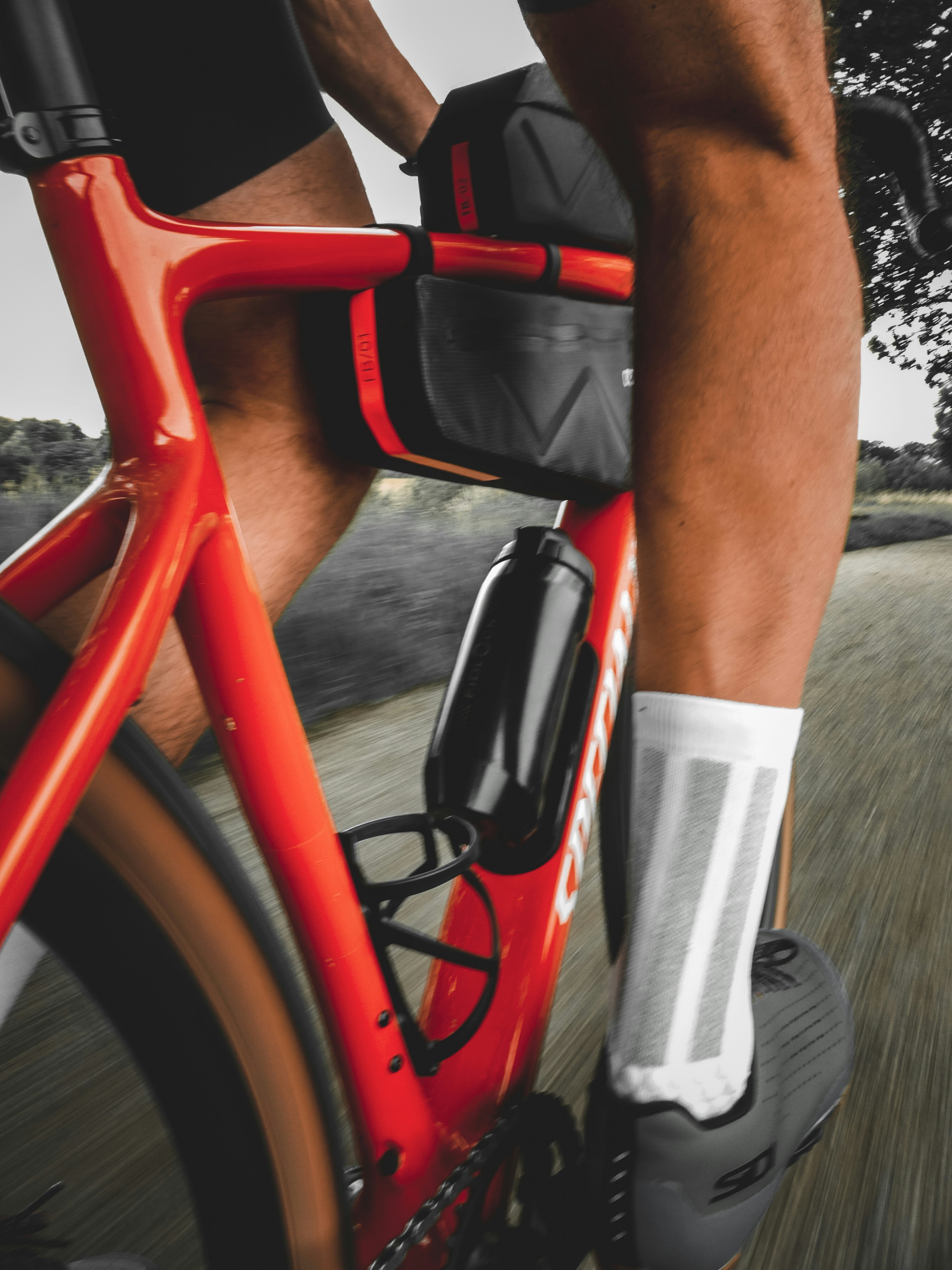 Red Racer: Mid-Stride Focus on a Lightweight Road Machine