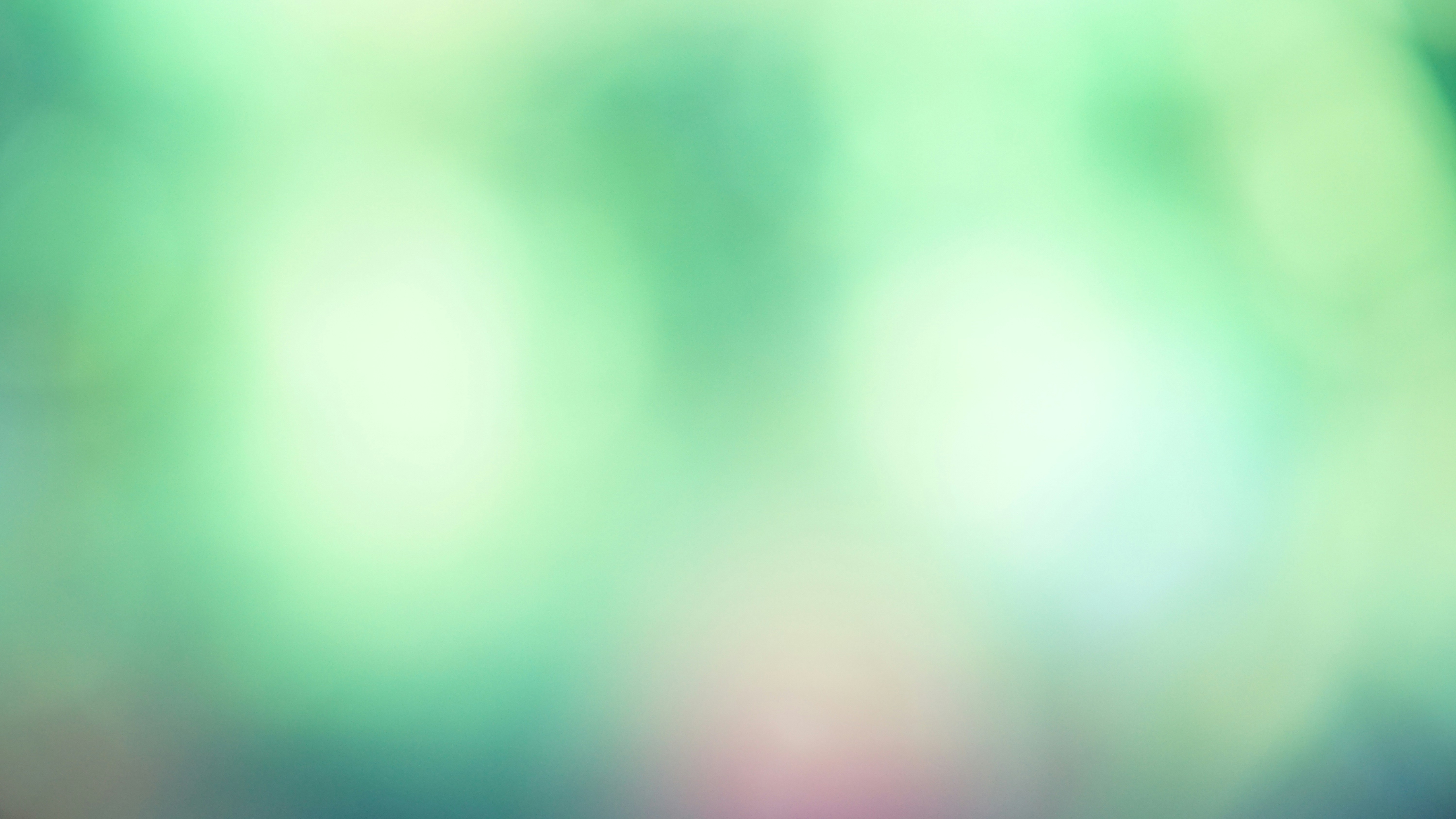 Verdant Blur: A Faded Greenscape with Hidden Light