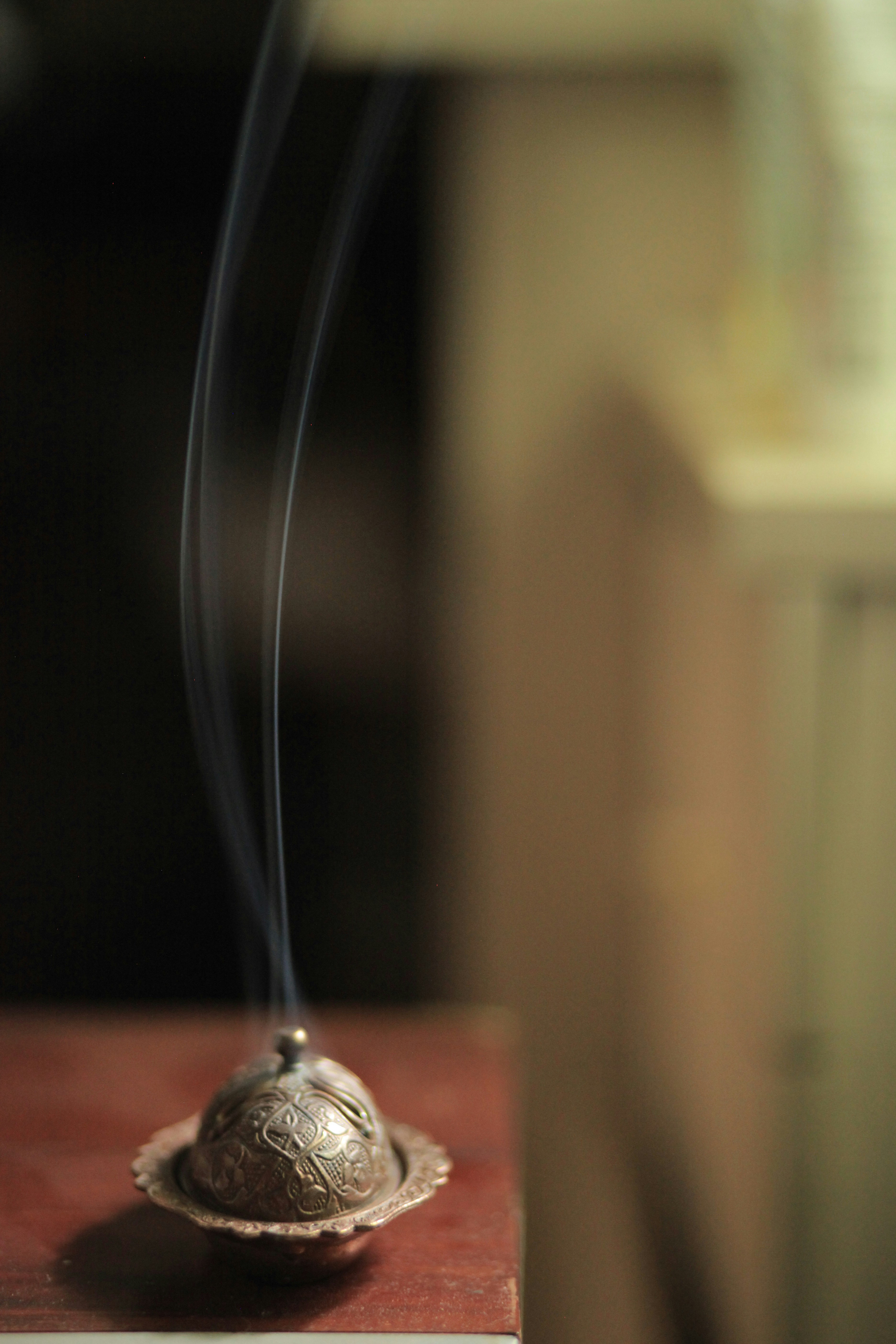 Floating Wisps Over a Sacred Vessel