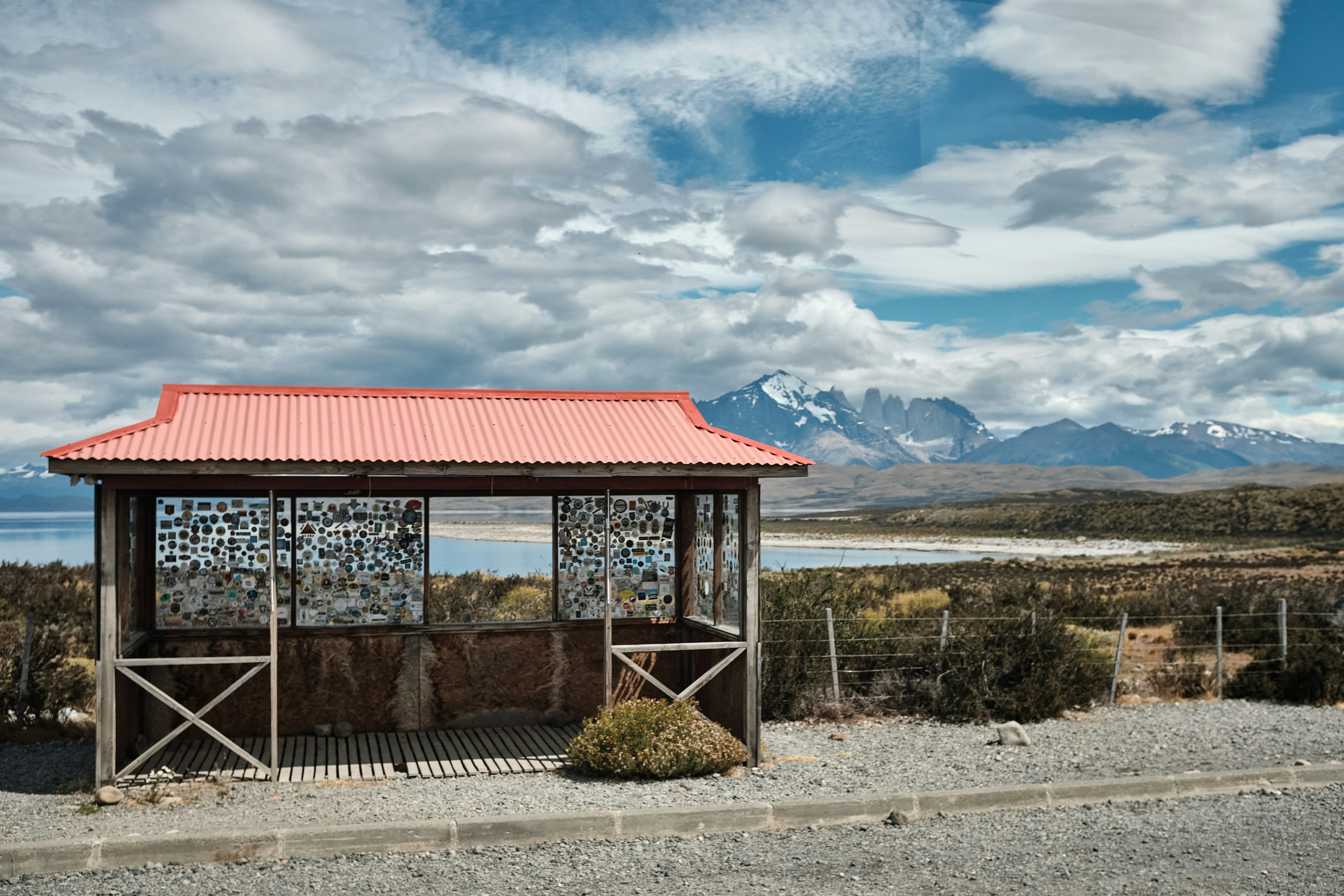 Deserted shelter by the salt flats under brooding skies