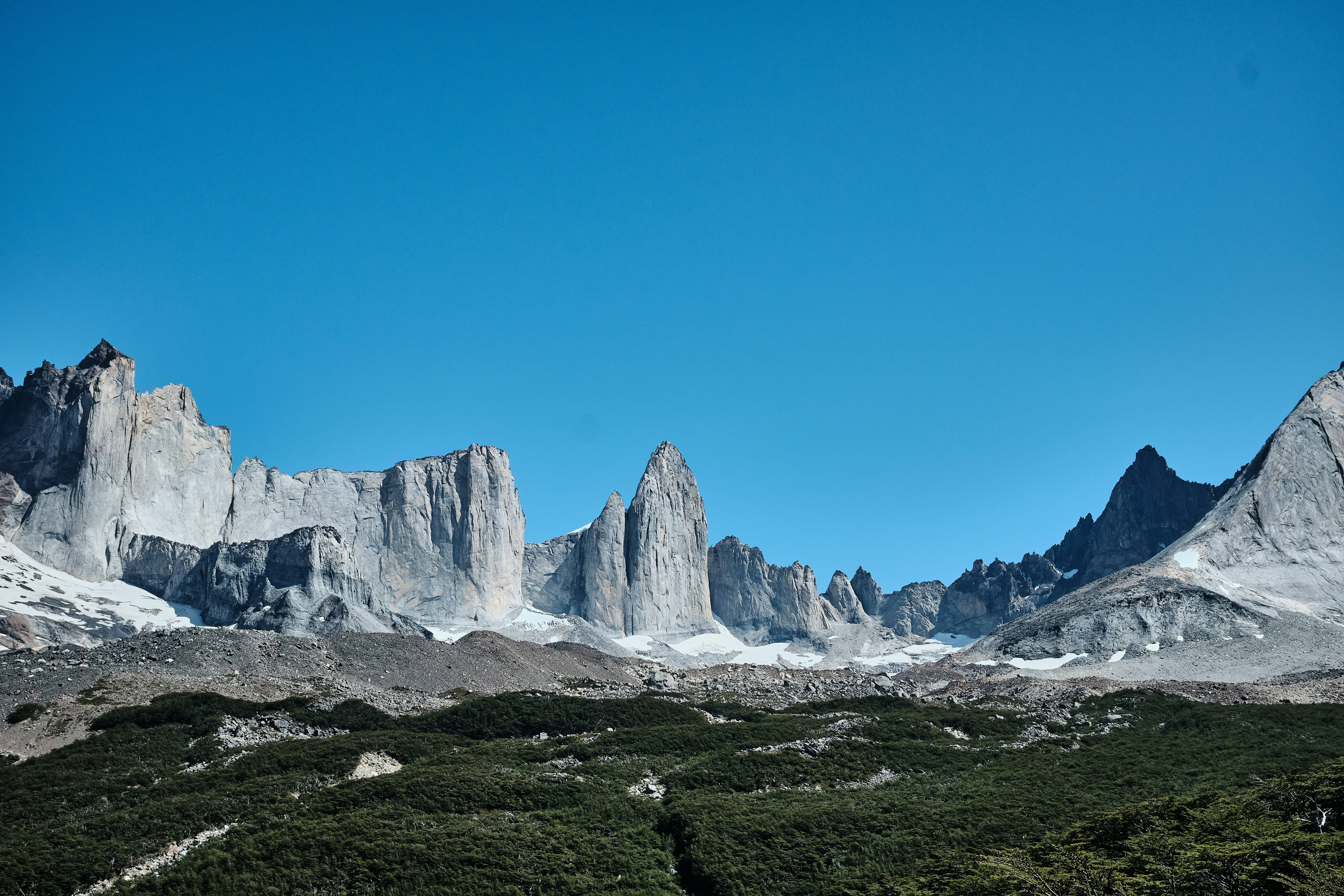 Jagged Sierra Under a Pristine Blue: A Snow-Burnished Ridge Stands Against Clear Sky