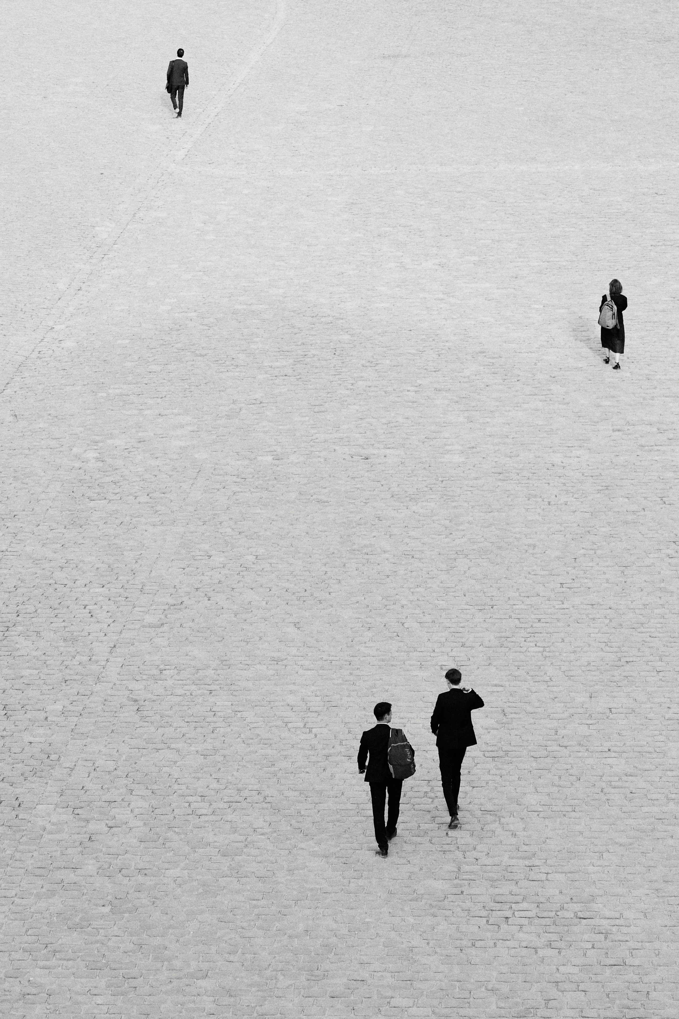 Three Solitudes on a Quiet Square