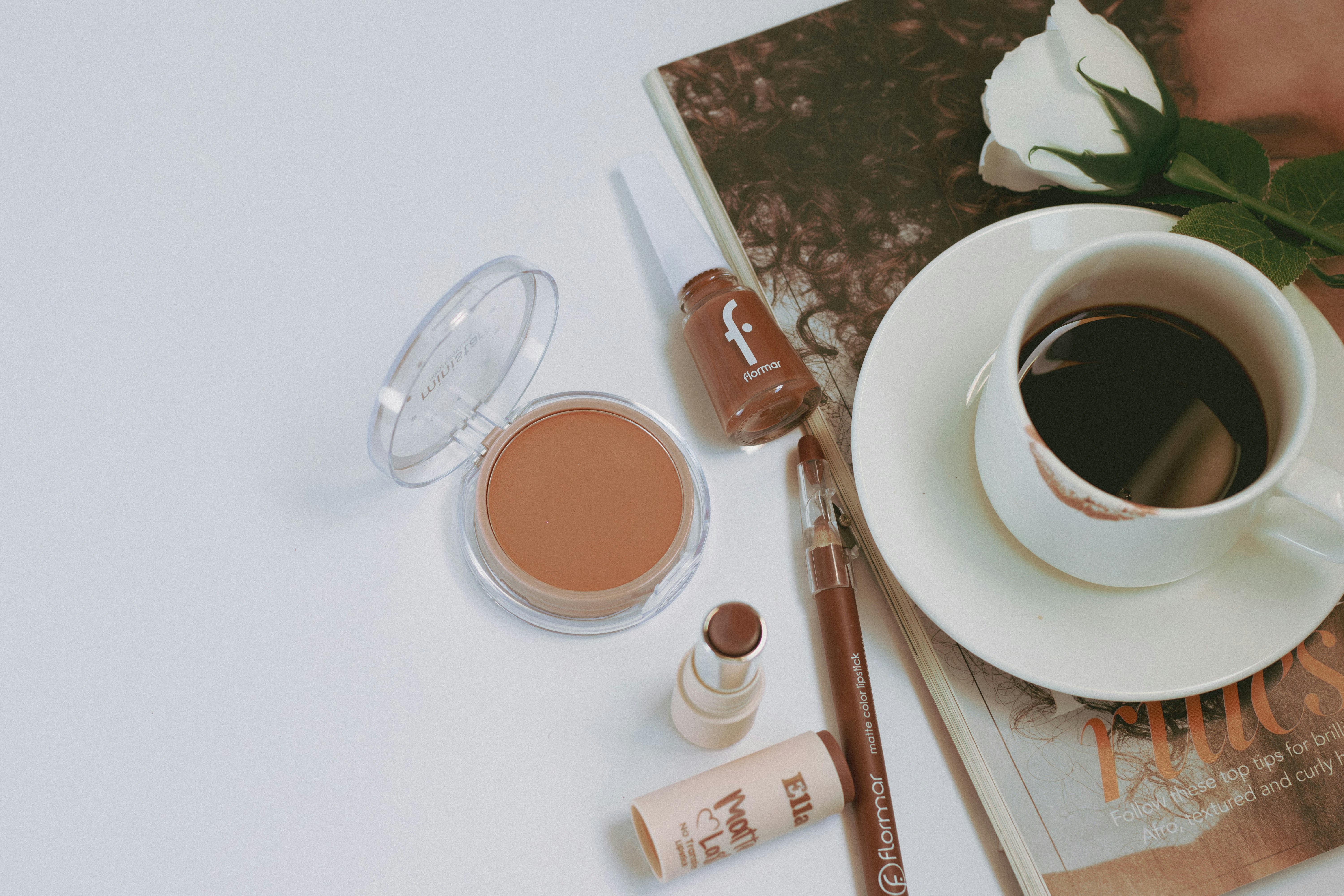 Morning Brew and Beauty: A Quiet Latte with Lipstick and a Ring Light