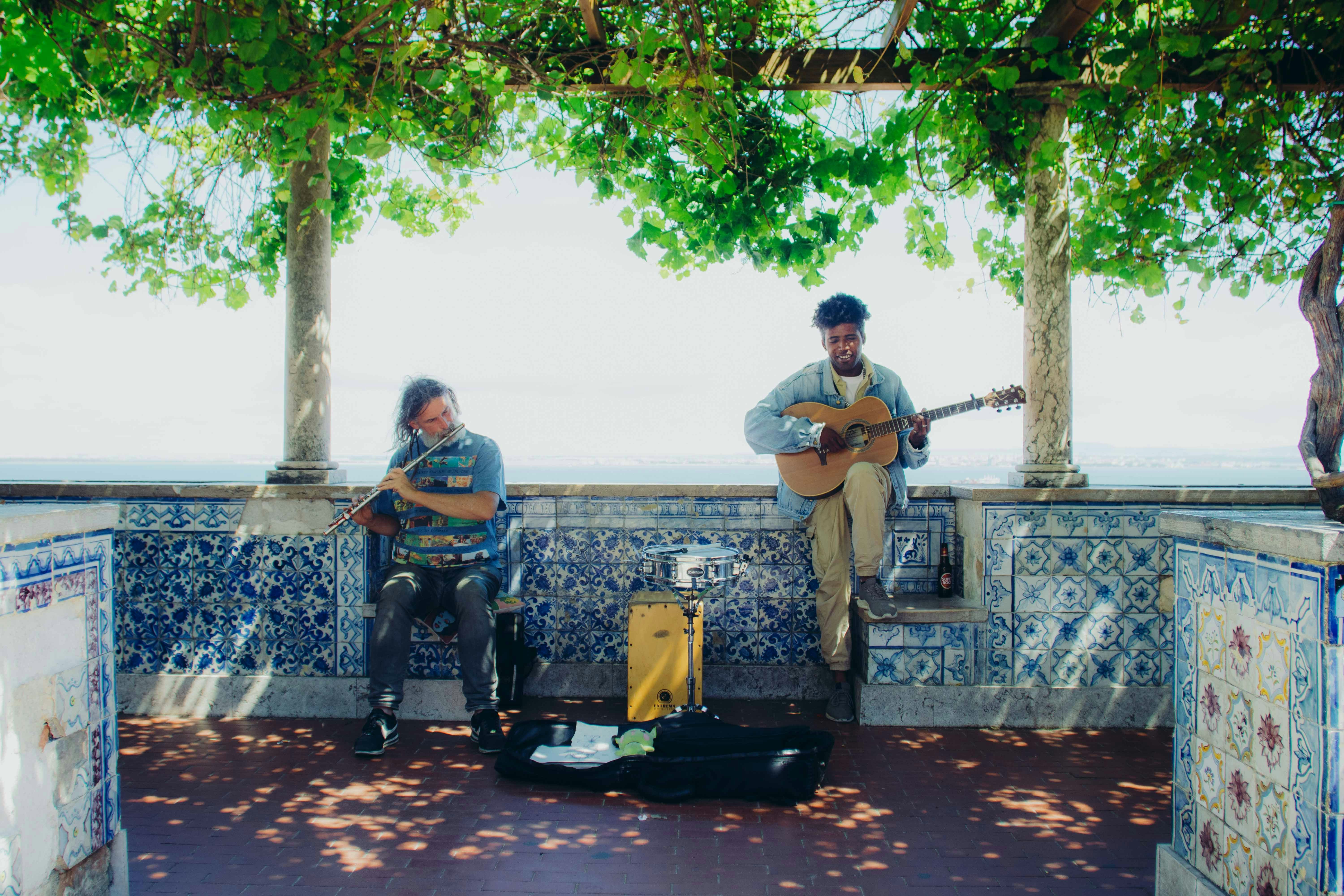 Guitar, Voice, and Tiles: A Quiet Serenade in the Garden