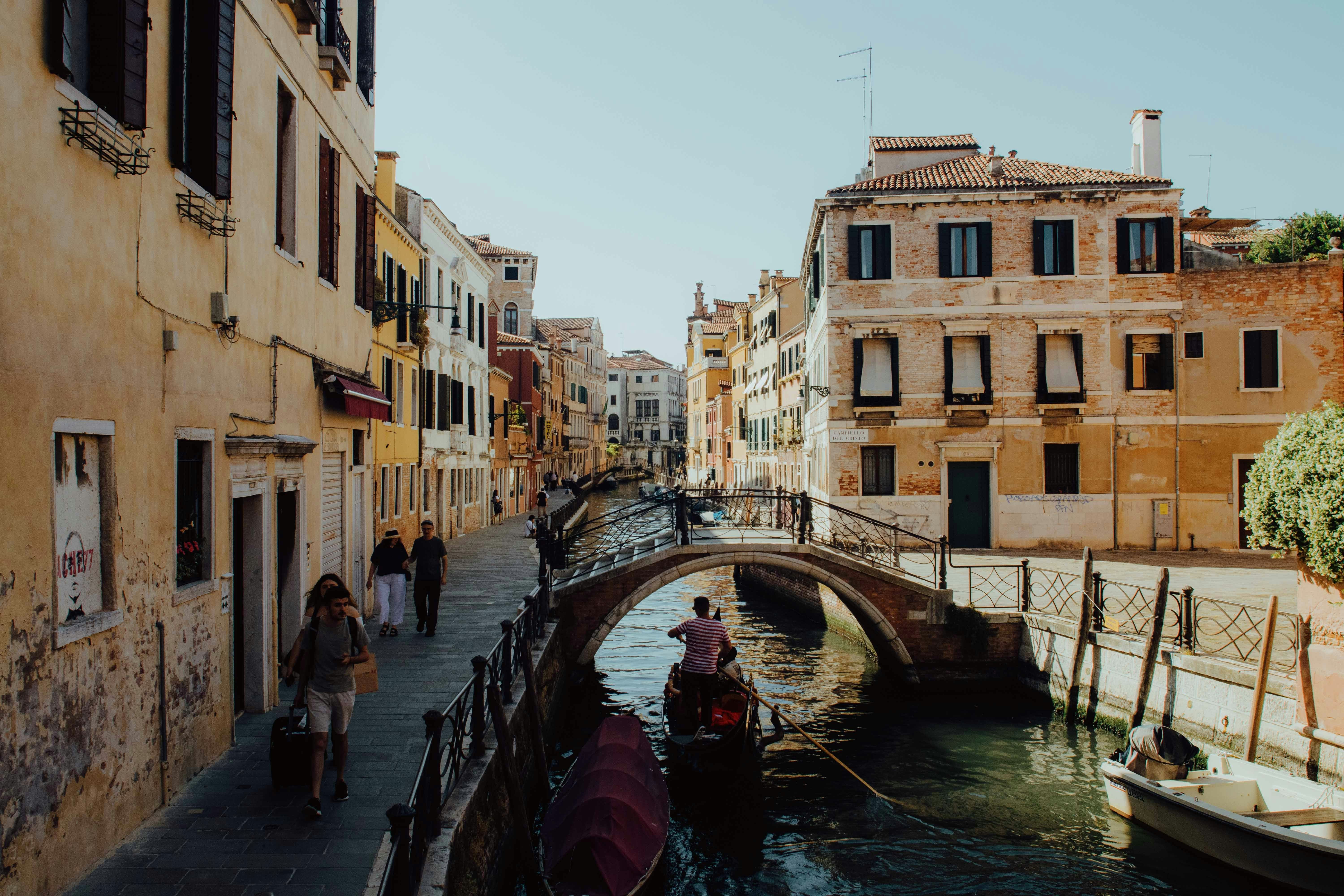 Canal-side Vista: Sunlit Vale of Venetian Stairs and Bridges