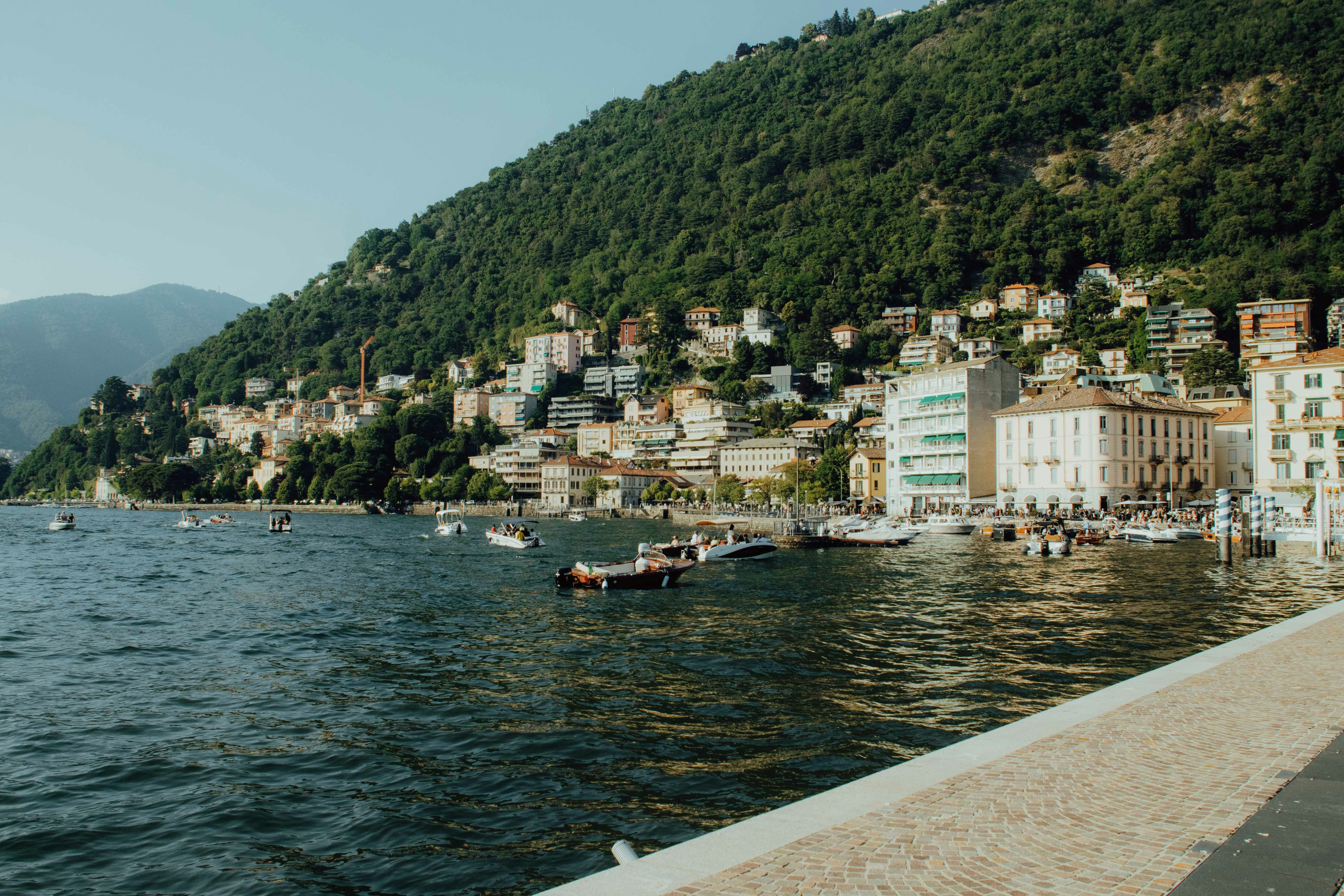 Lakeside Harbor Terrace with Distant Town and Green Hills