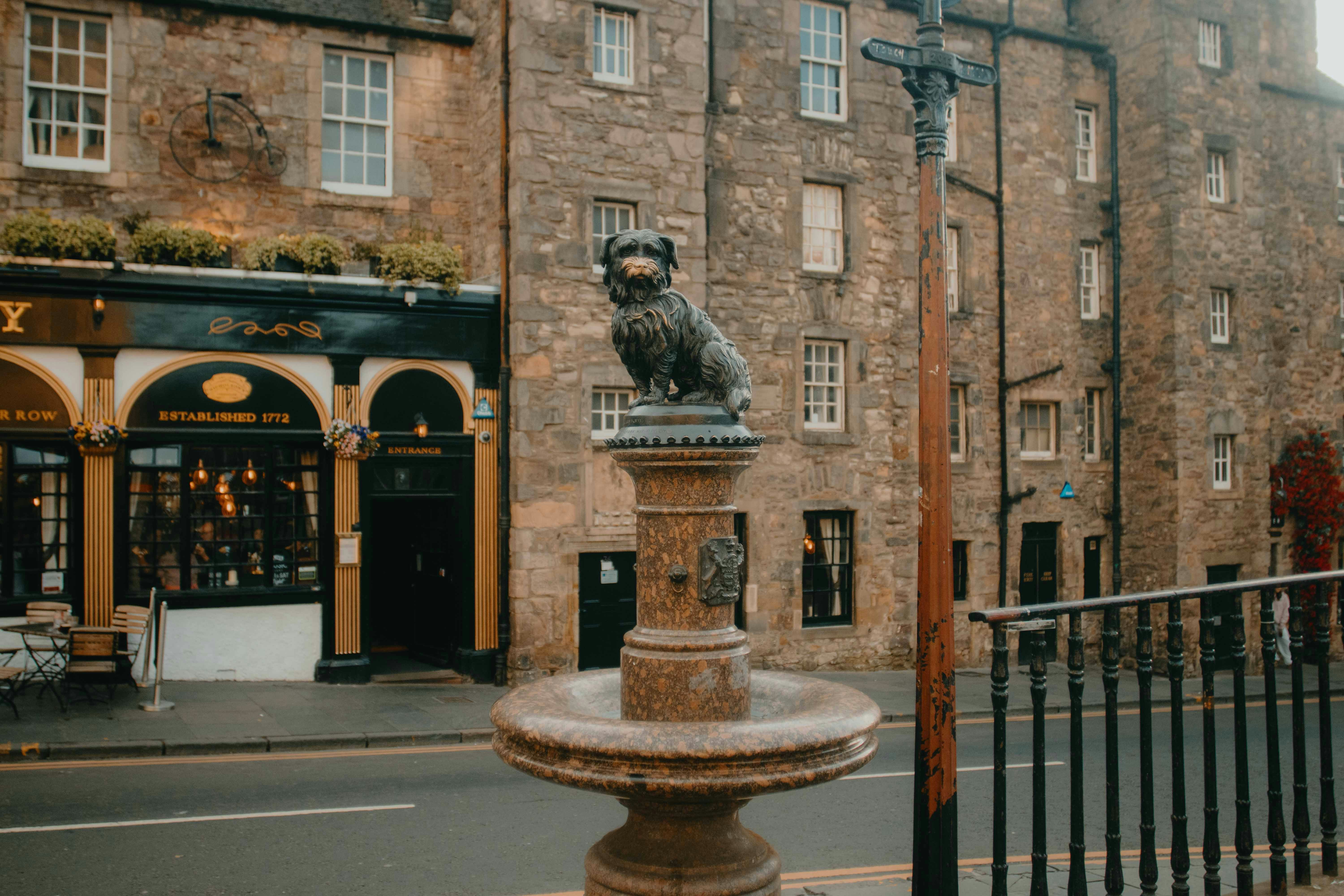 Stone Lion Fountain Courtyard: A Quiet Street Scene in Warm Evening Light