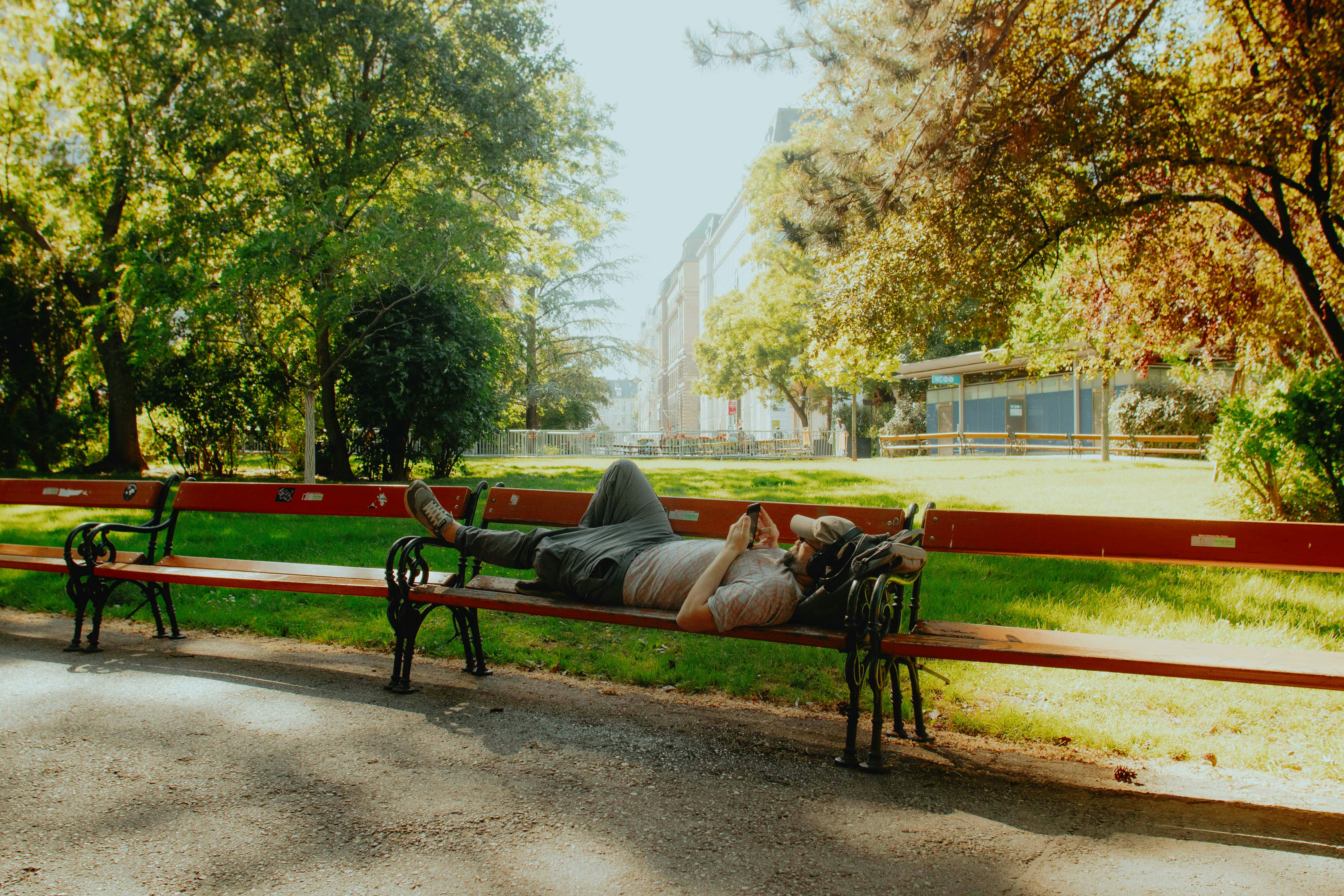 Relaxing in the Sun: A Jogger's Bench Break