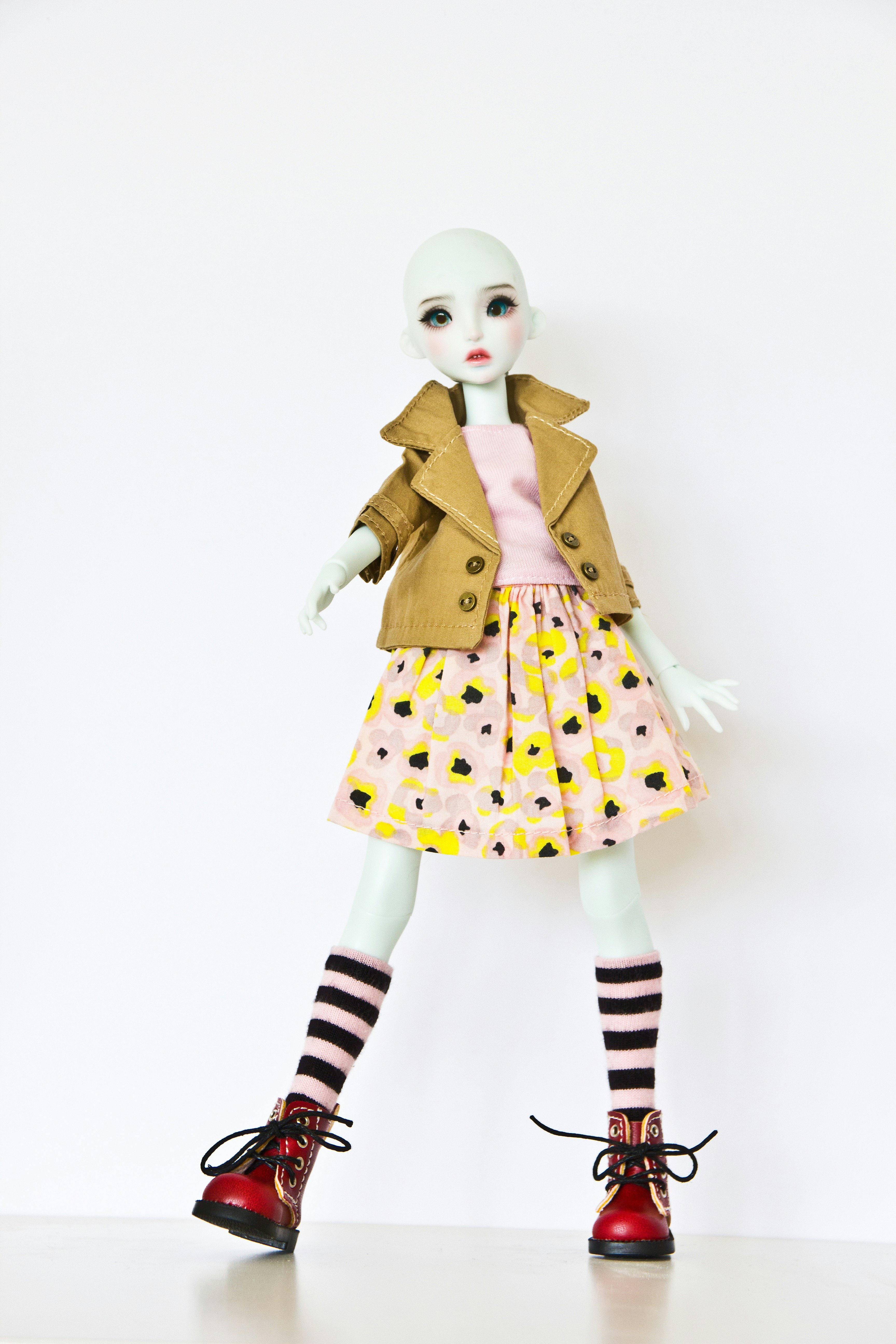 Powdered porcelain with denim, plaid, and combat boots