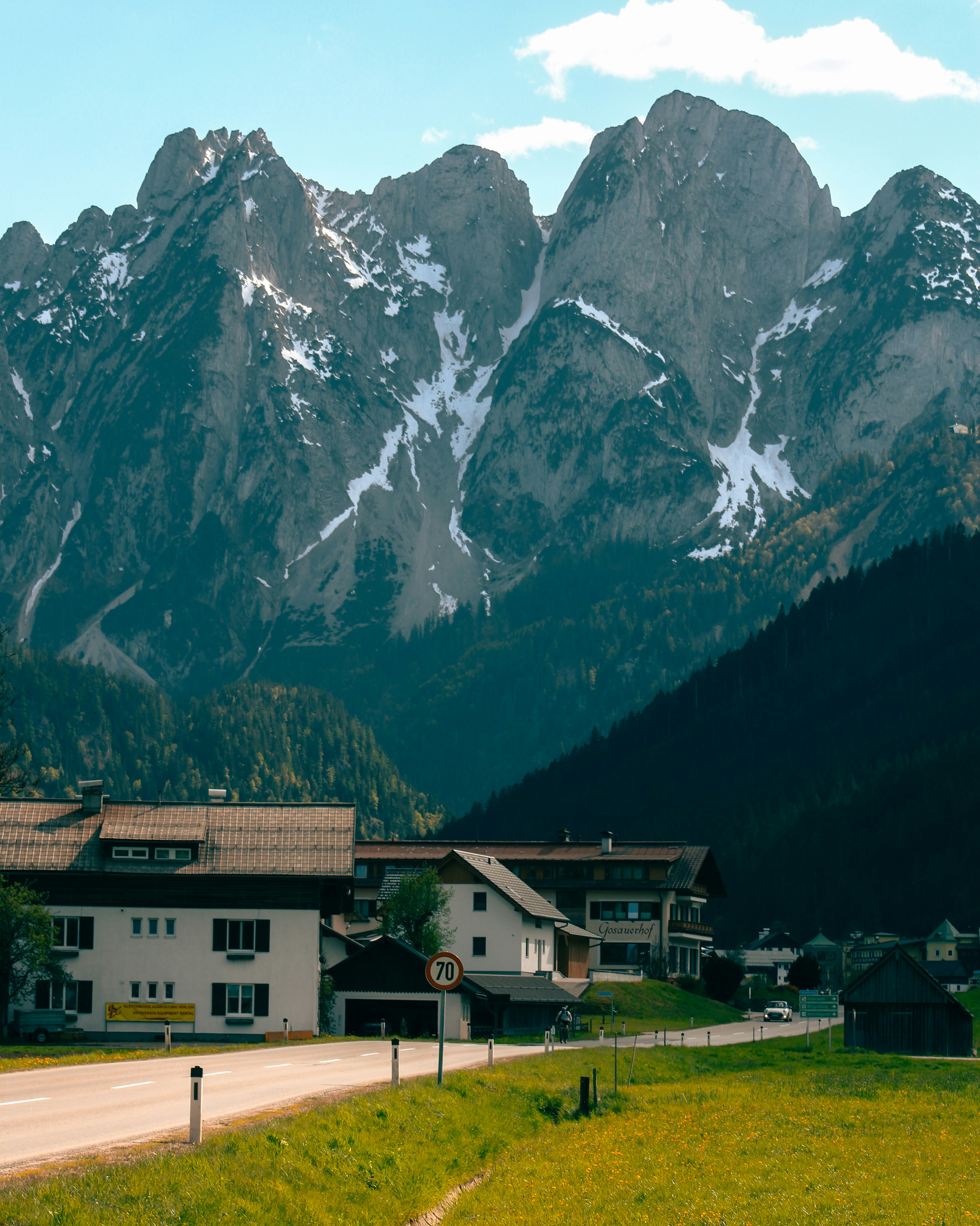 Alpine Village Beneath Looming Peaks