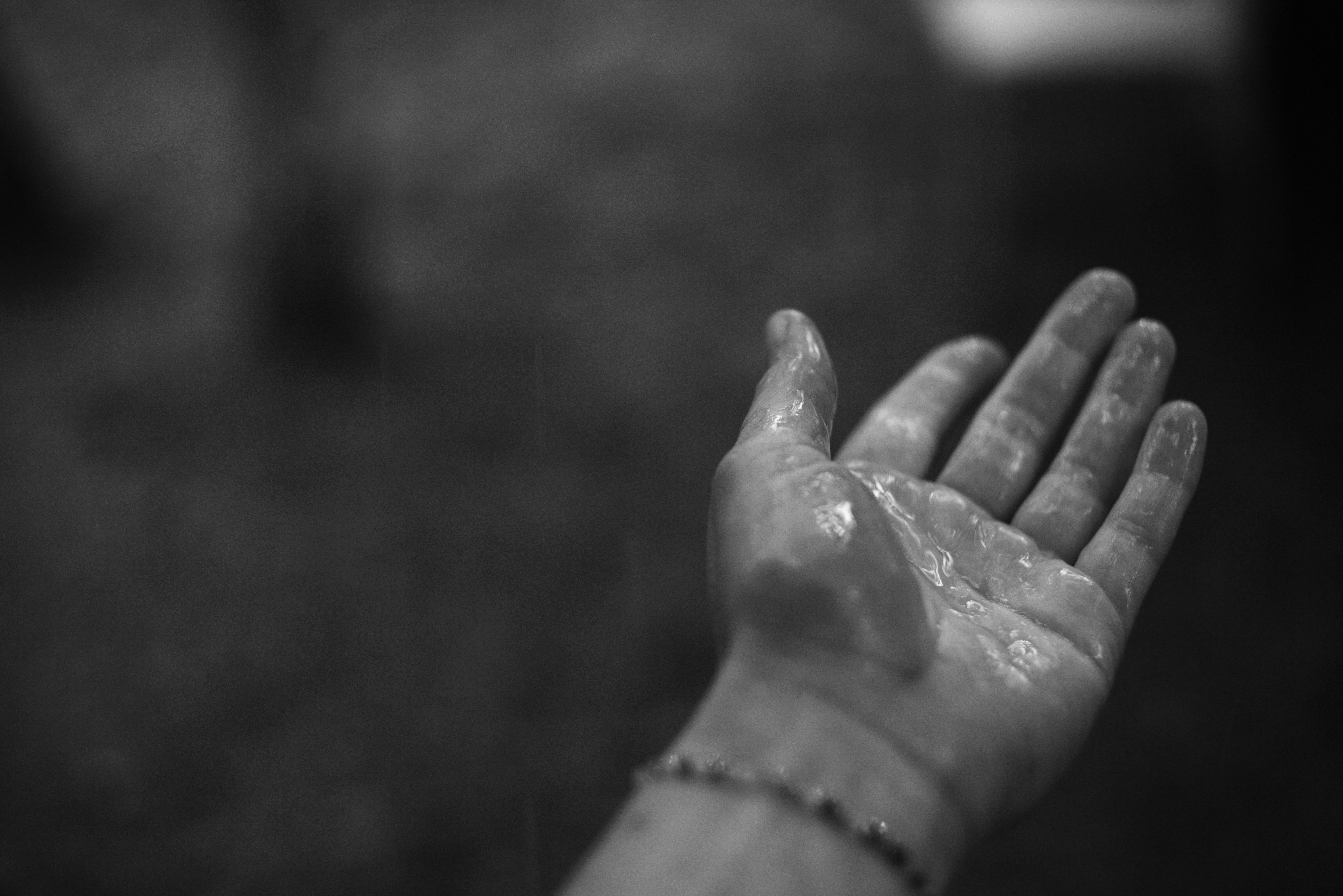 Outstretched Palm in Focused Nightlight