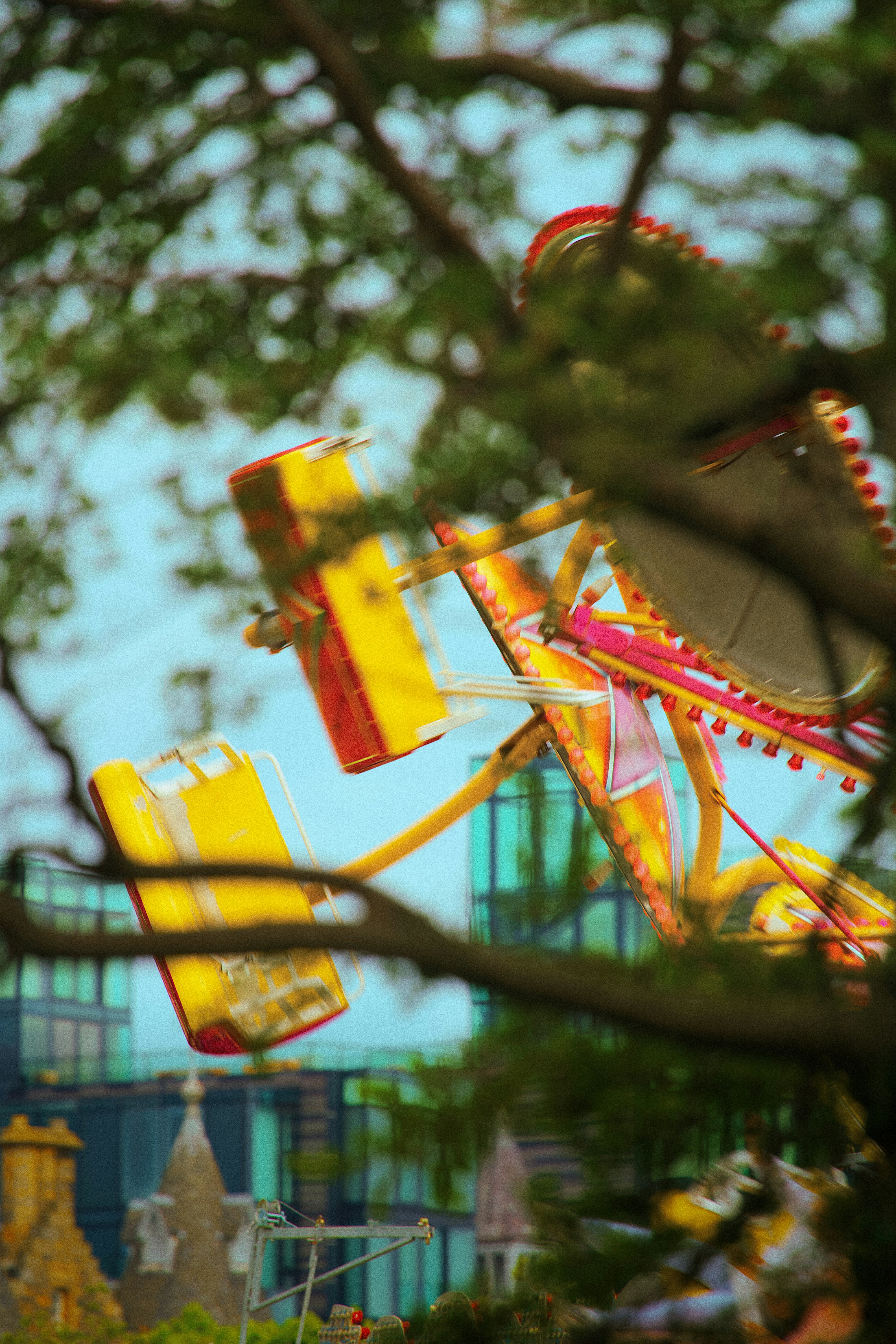 Speeding Colors: A Blur of Joy on the Carnival Swing