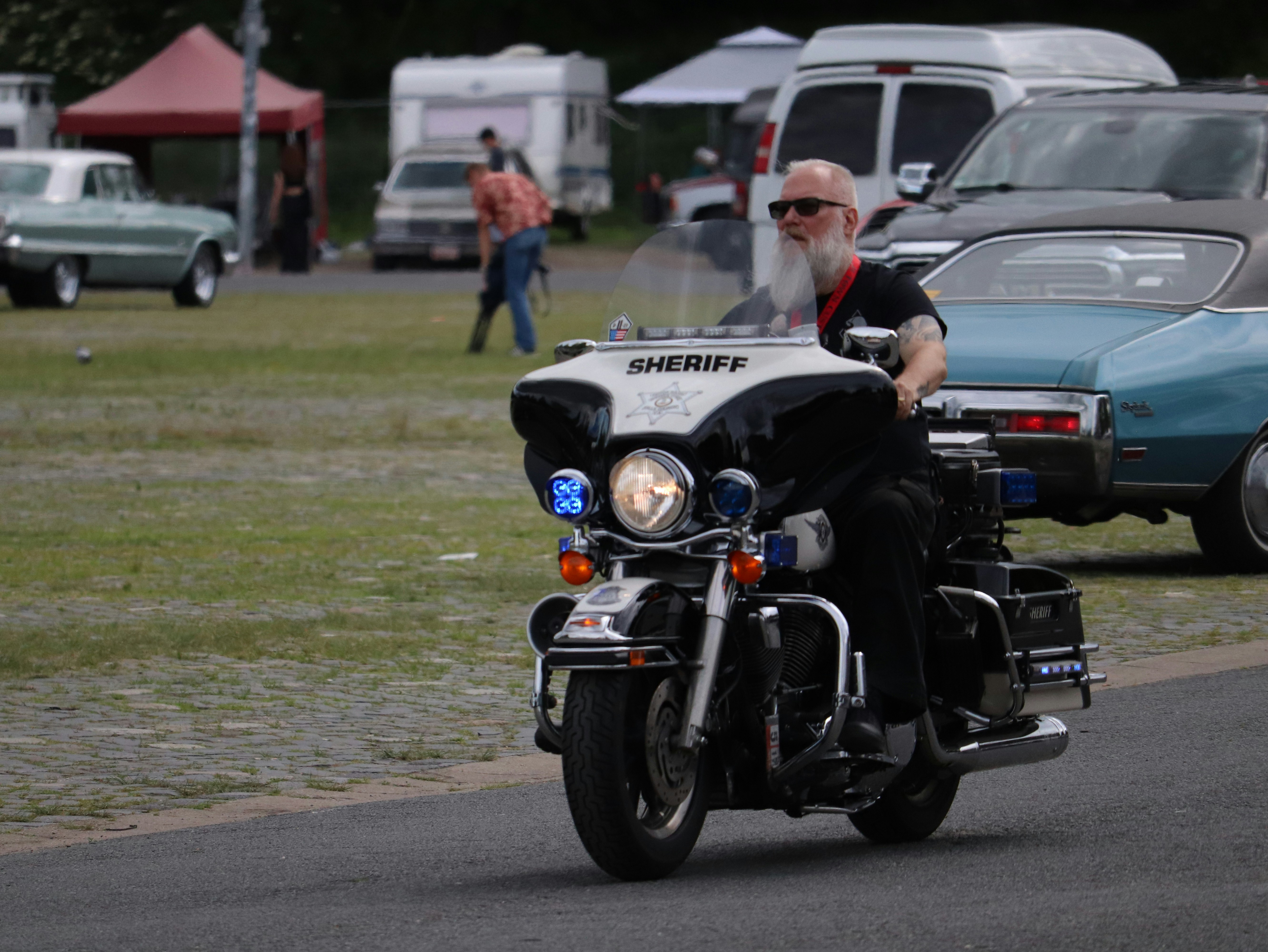 Long-Exposure Vigil: Sheriff on Two-Wheeled Patrol