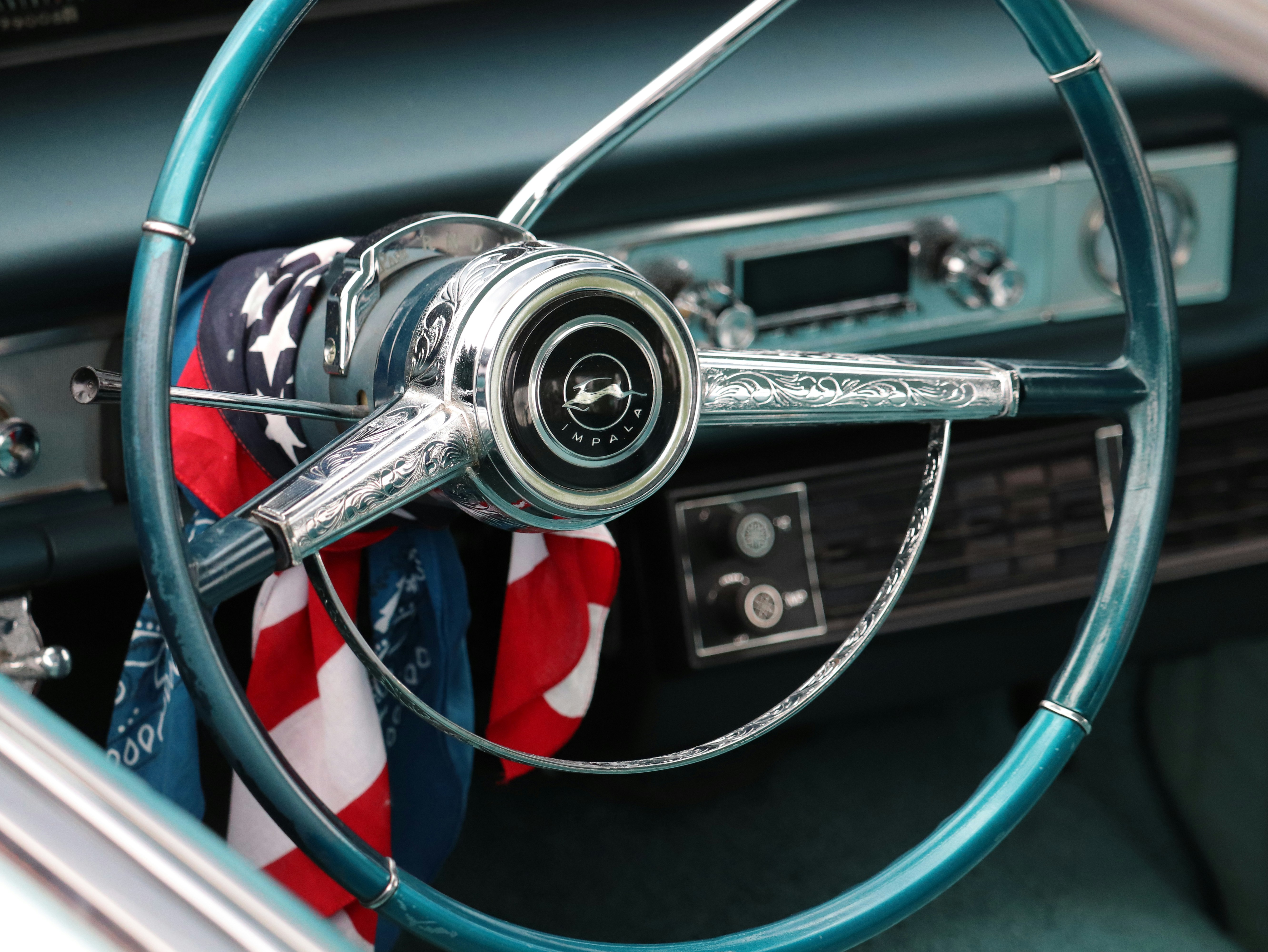 Heritage in the Driver's Seat: A Vintage Dash with Flags
