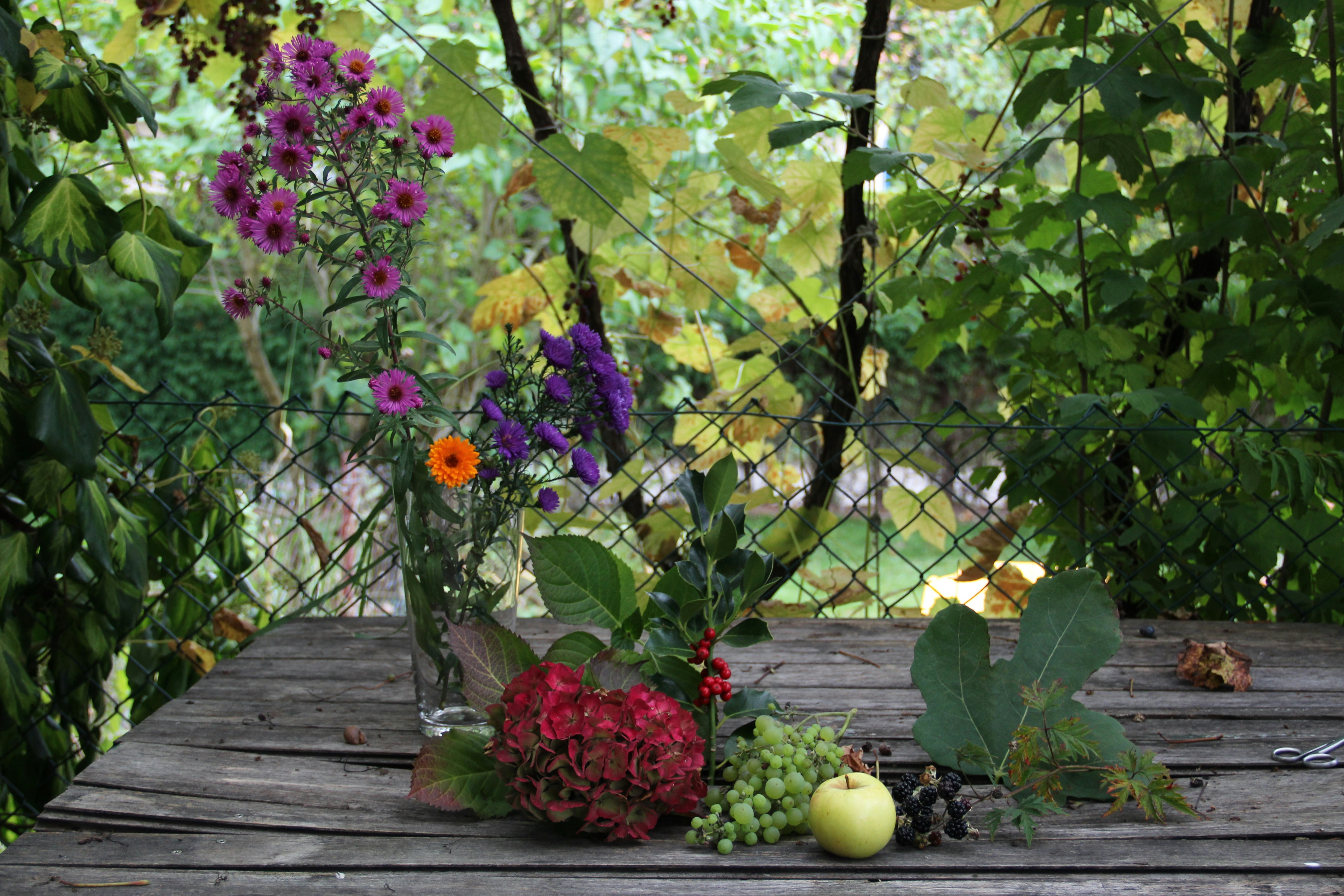 Still Life on Wooden Planks: Bouquet and Orchard Bounty