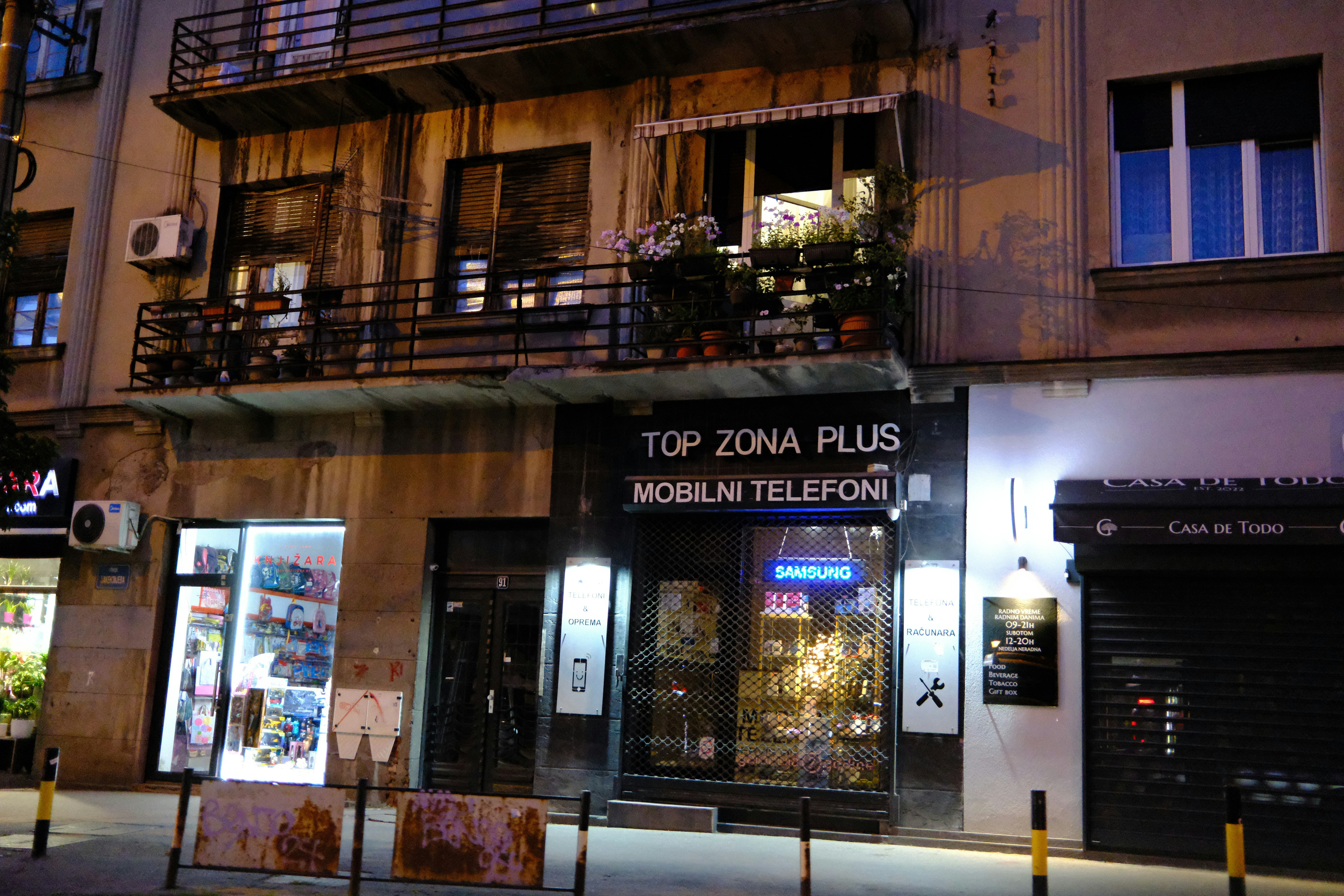 Neon Gate: Evening Neon and Shopfront in a Quiet Street