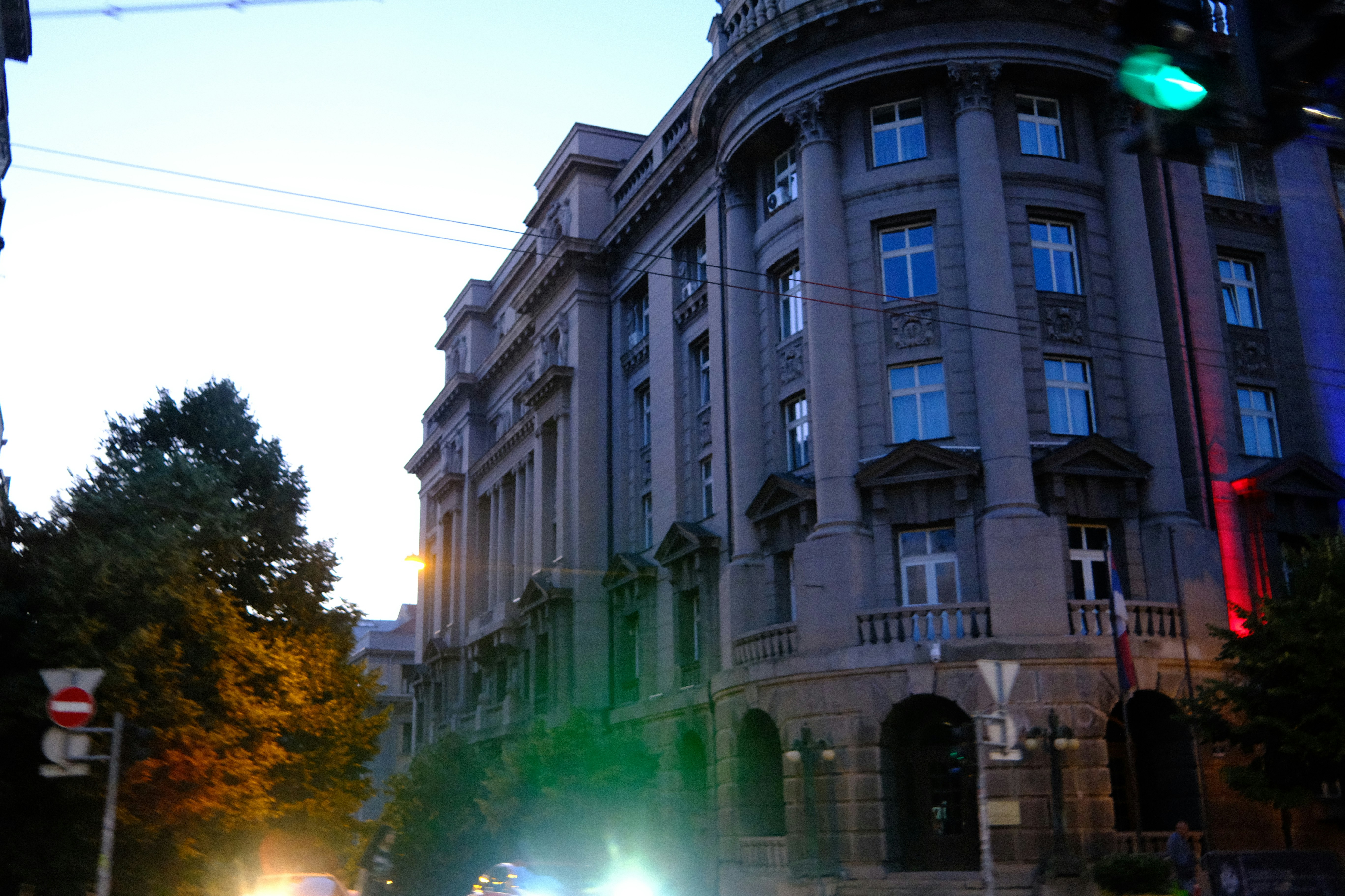City Hall Portrait: Evening Facades and Neon Accents