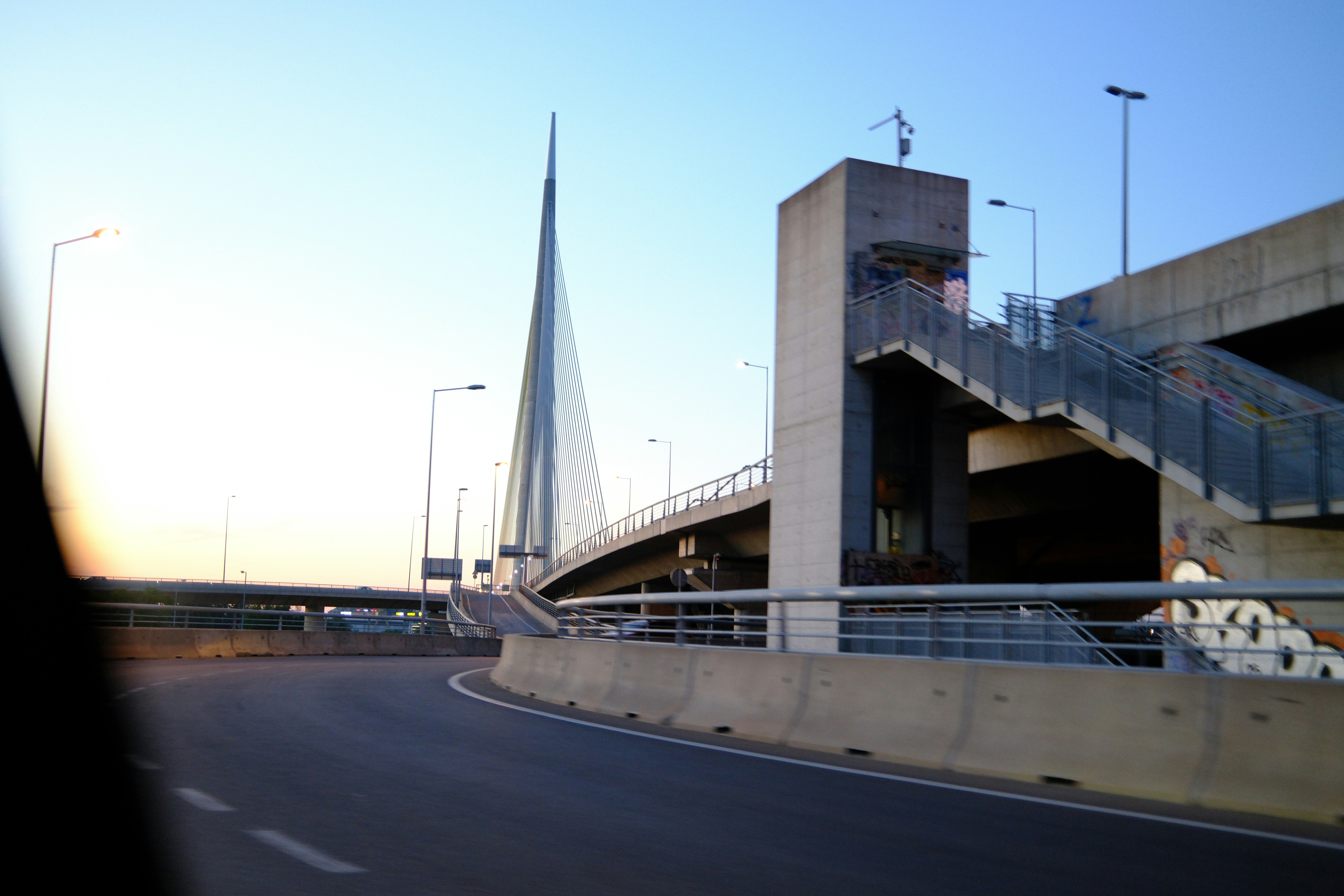 Curved Highway Toward the Slender Cable-Stayed Spire