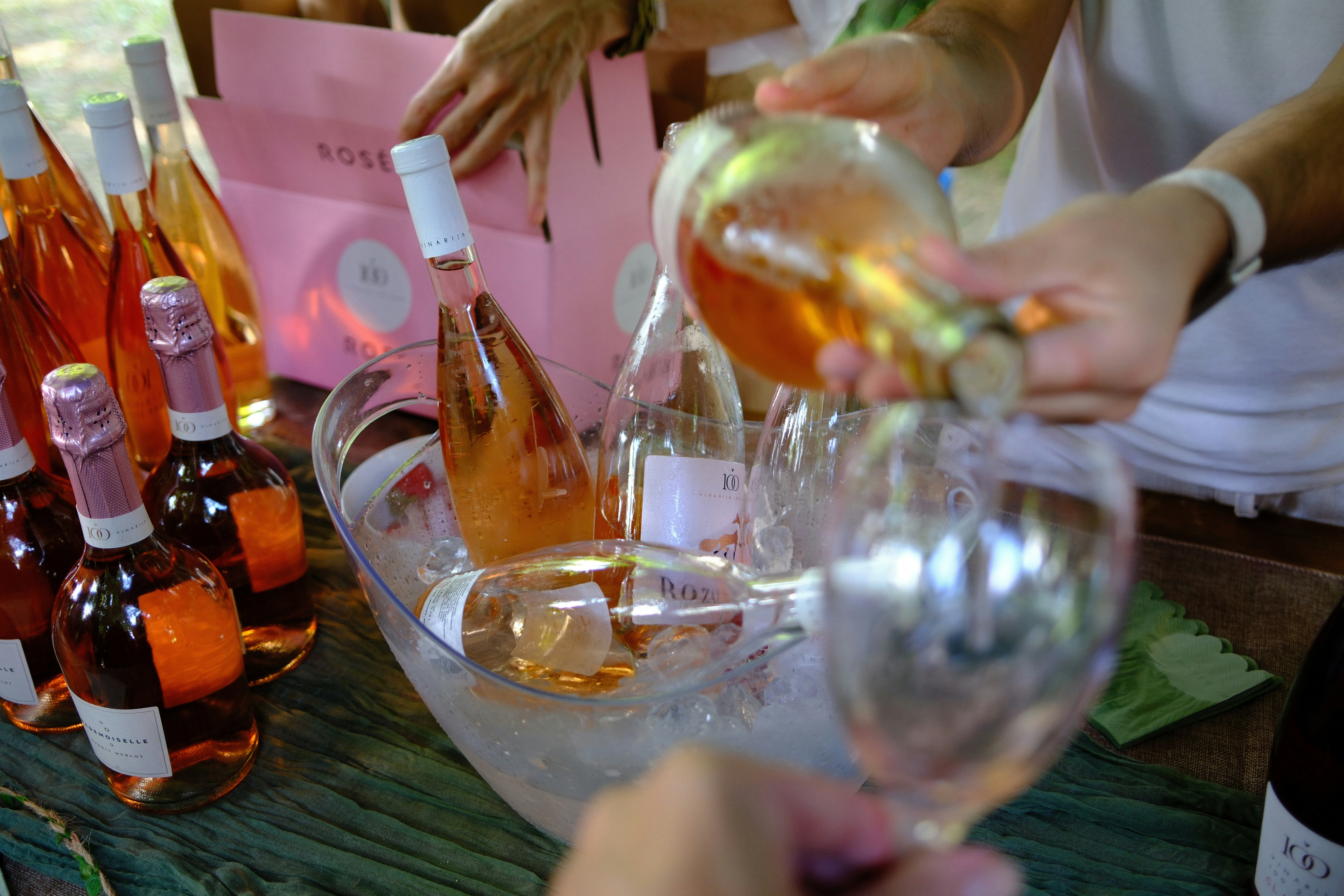 Toast at the Wine Bar: Bottles and Glasses in Motion