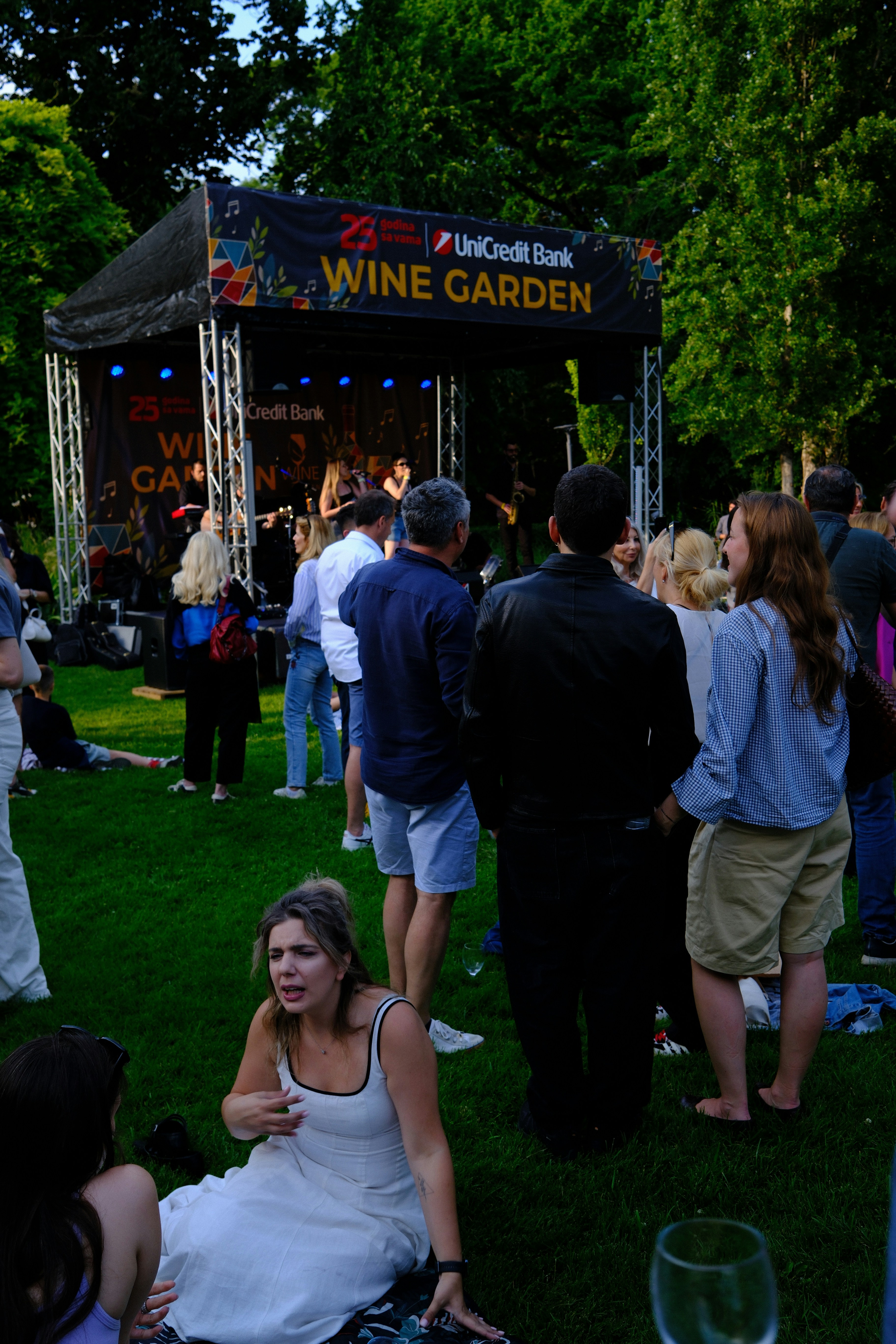 Wine Garden Stage: Evening Crowd Near the Band