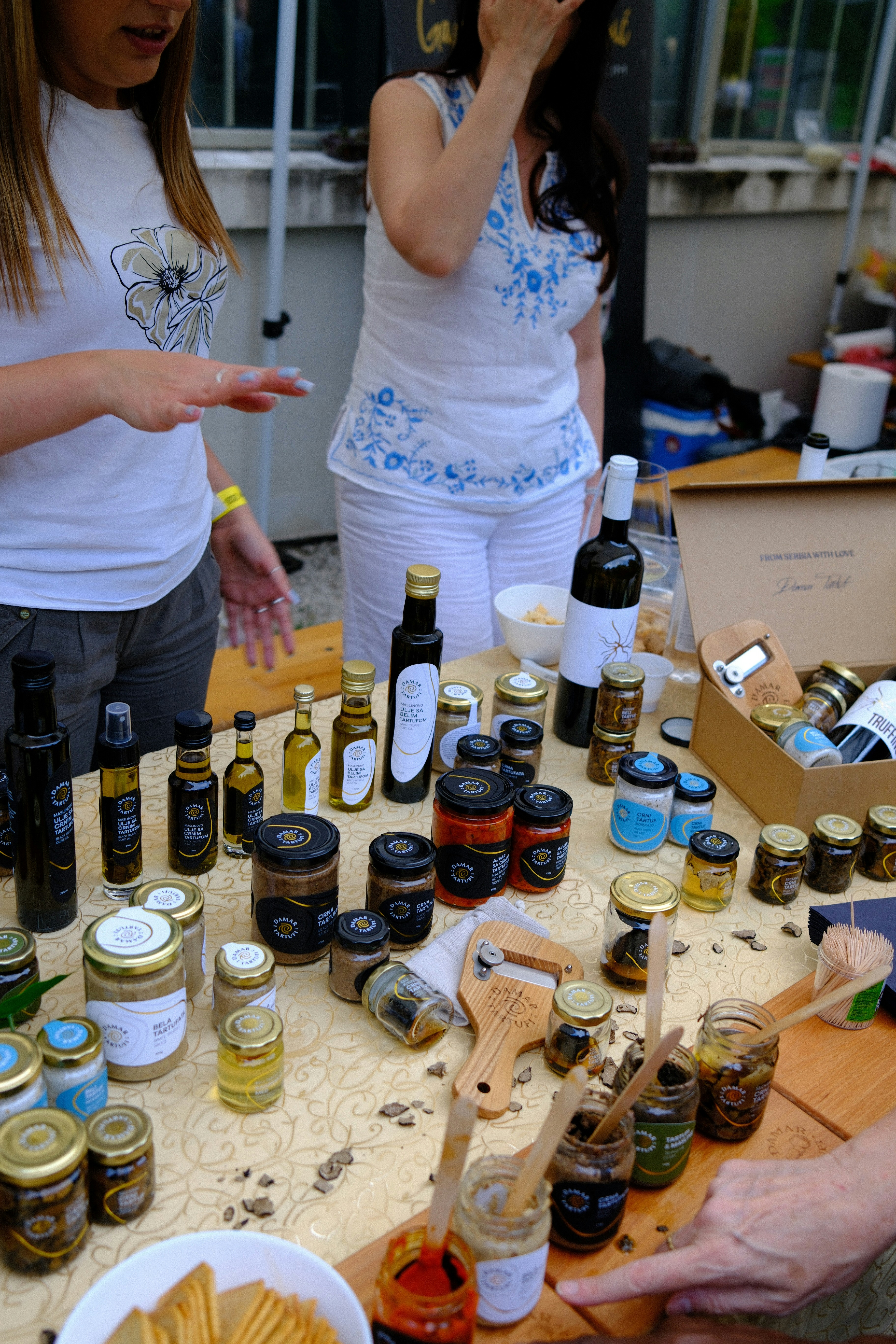 Market Stall of Golden Jars: A Moment of Craft and Conversation