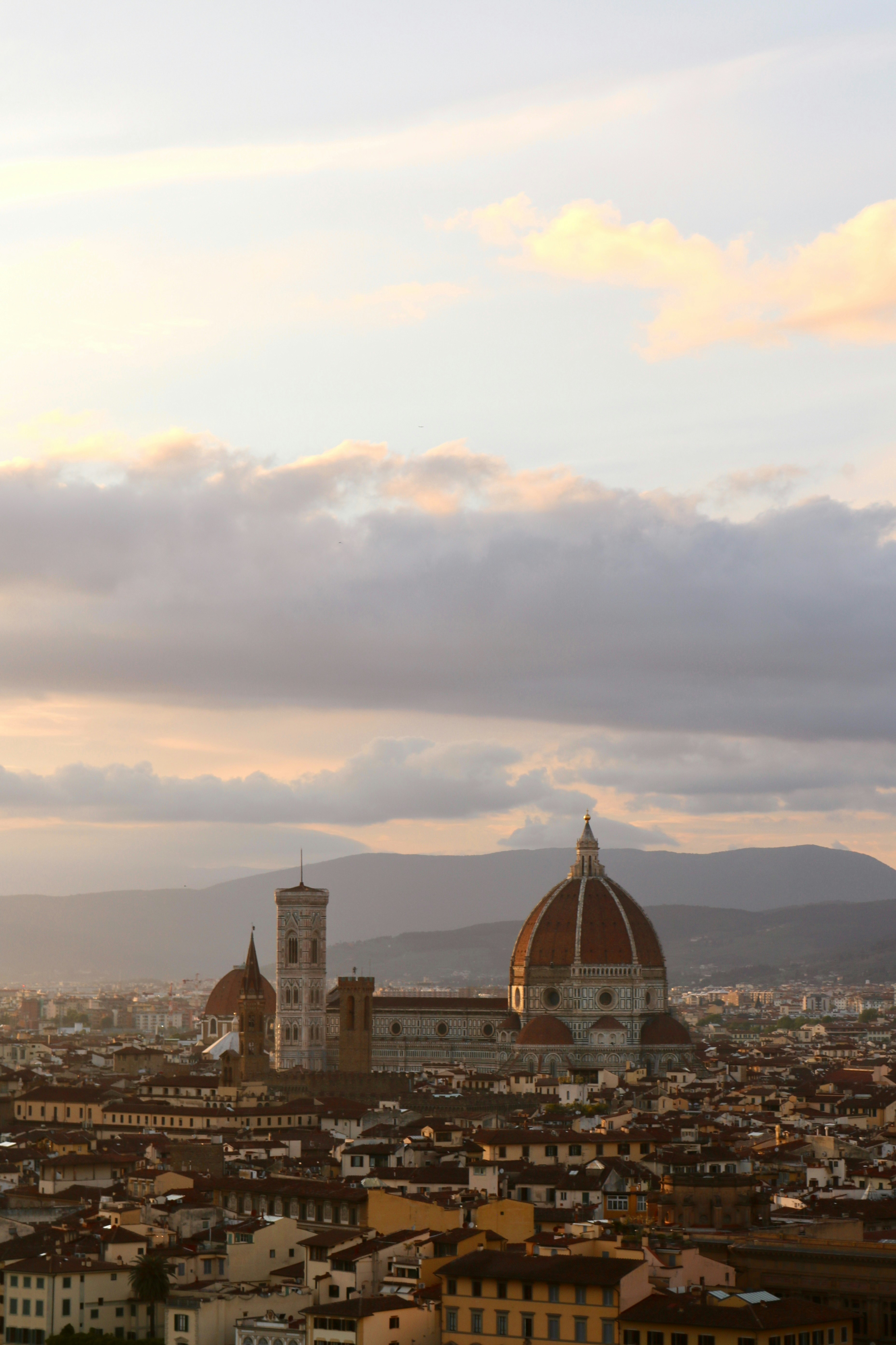 Dome and City at Sunset: Florence’s Baptistry and Duomo Emerges from the Rooftops