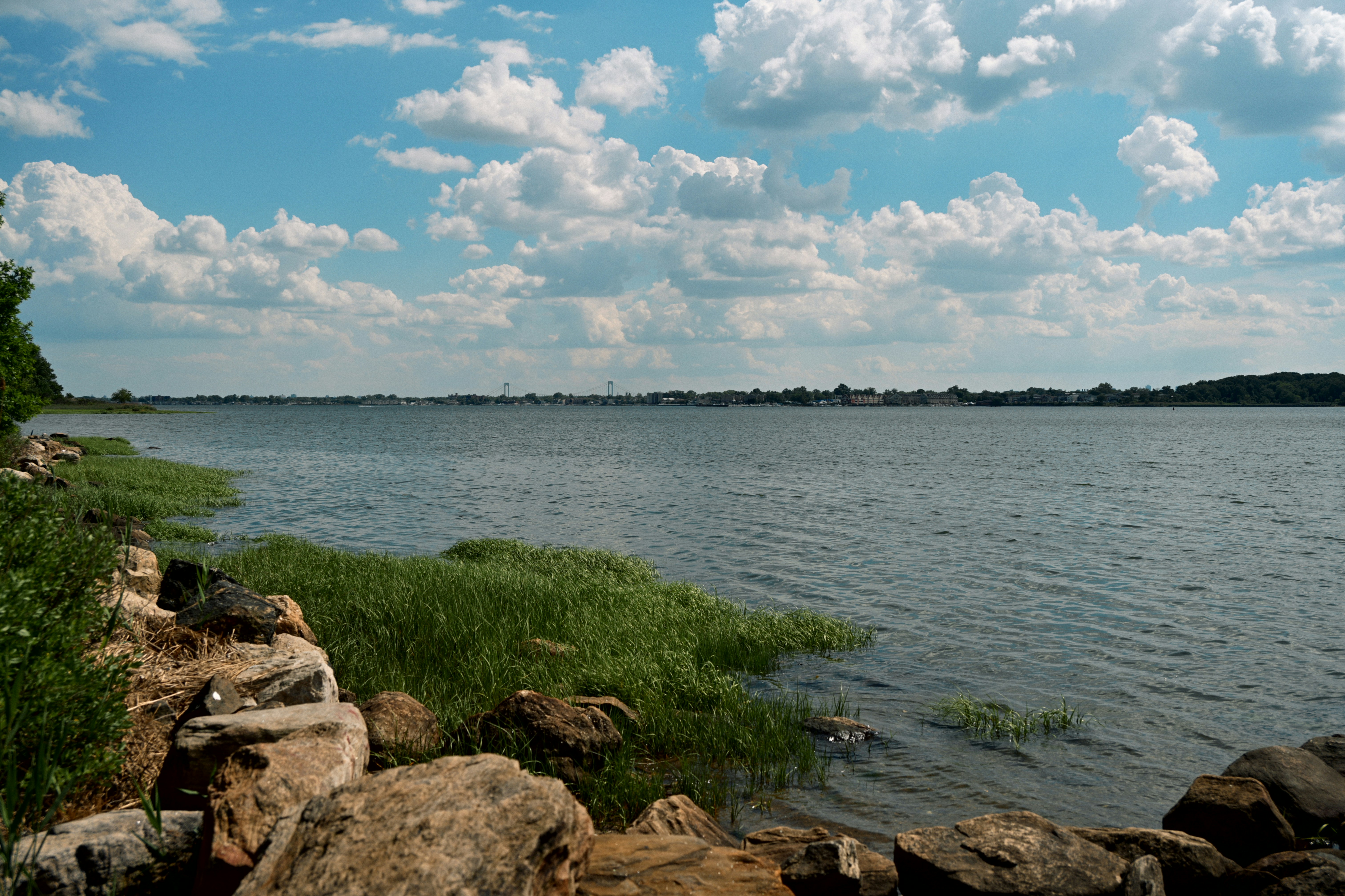 Lakeside Horizon: Quiet Stones and Open Water