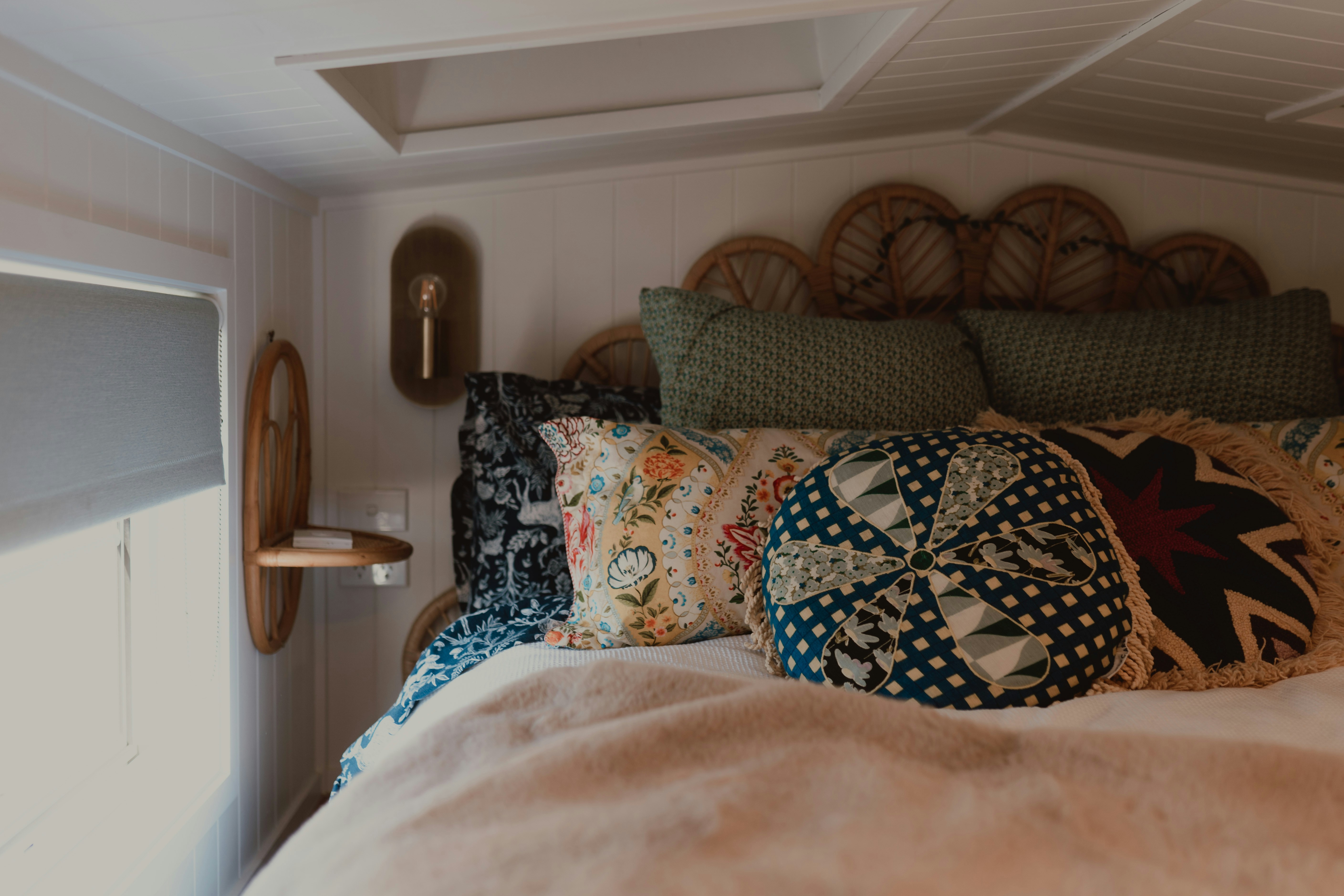 Quilted Tranquility: A Sunlit Bed Nook