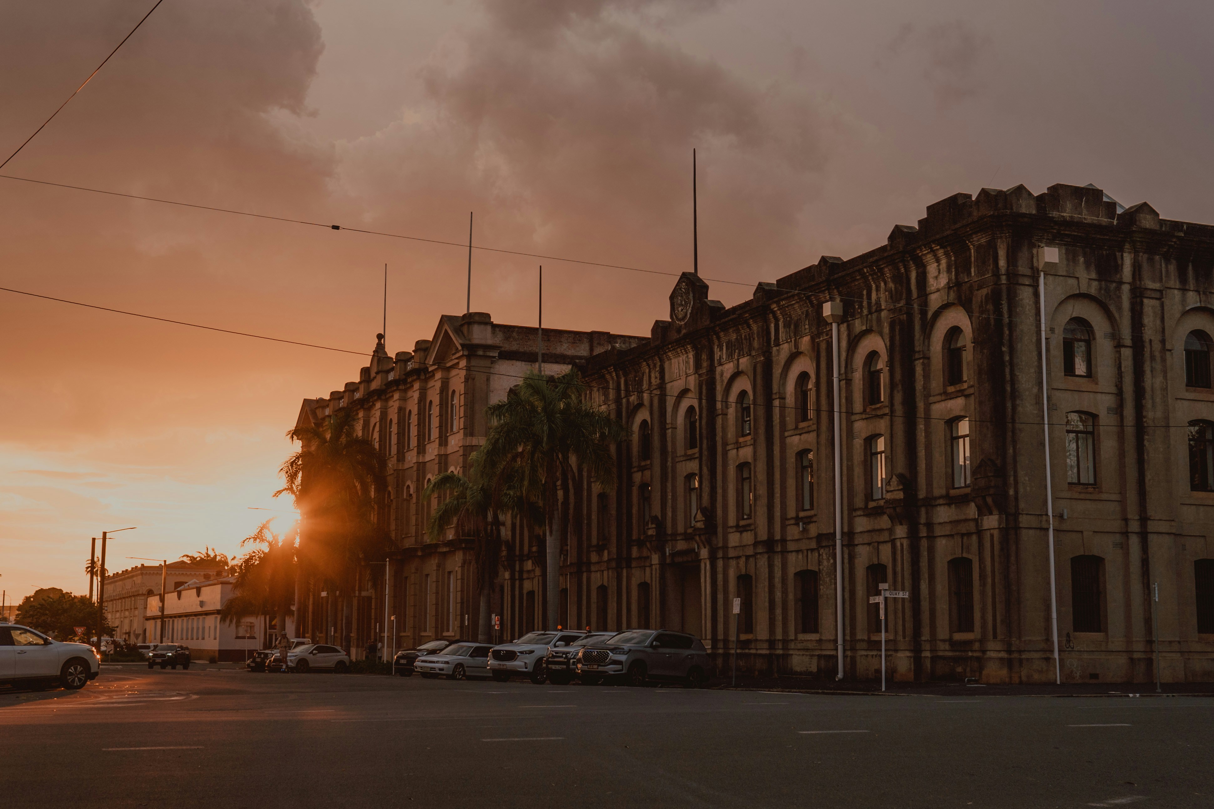Doors of Time: A Sunlit Facade Cast in Evening Ember